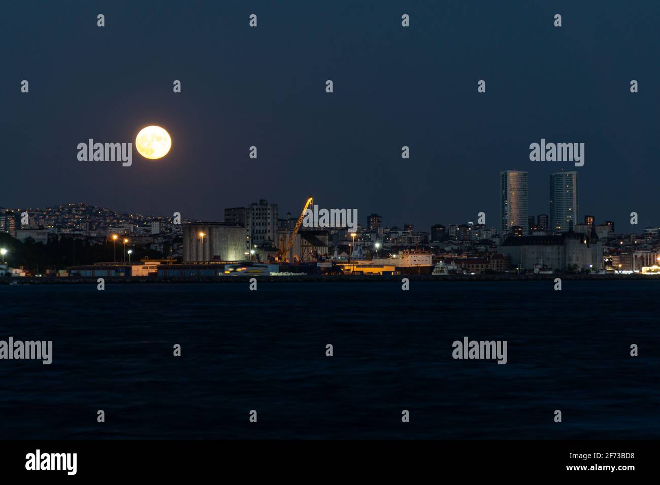 full moon rising over Istanbul skyline Stock Photo - Alamy