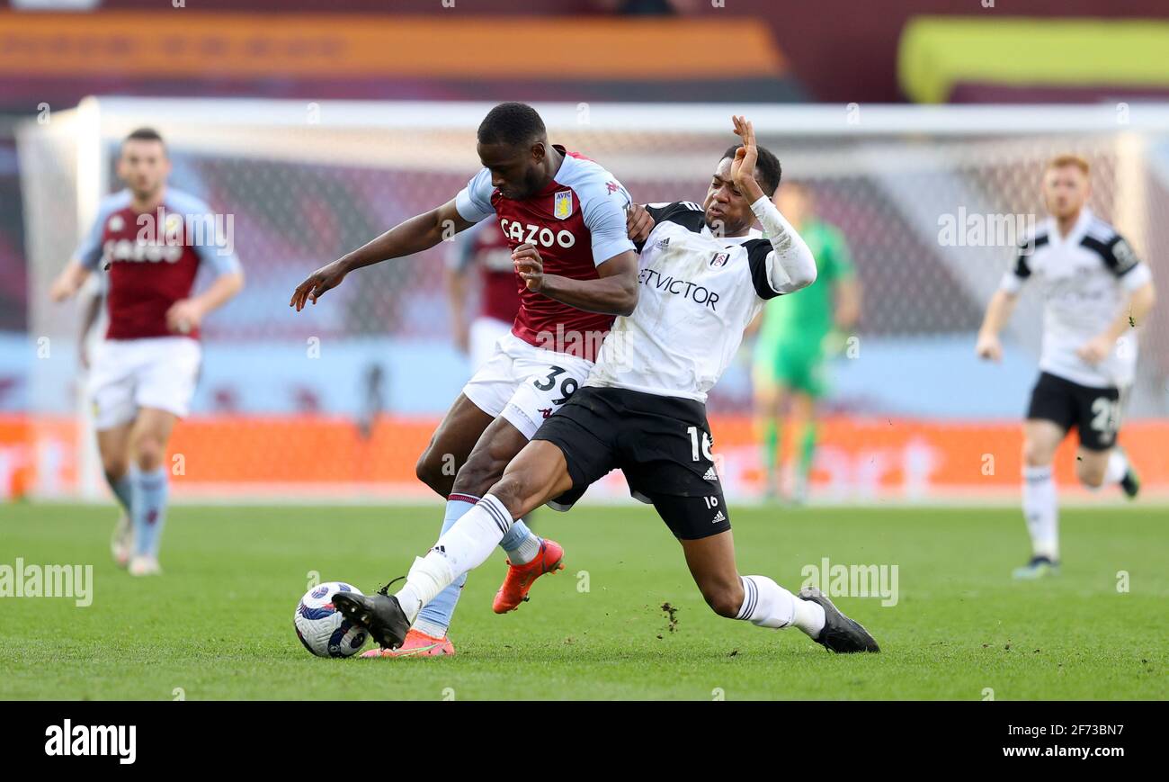 Aston Villa's Keinan Davis (left) and Fulham's Tosin Adarabioyo battle ...