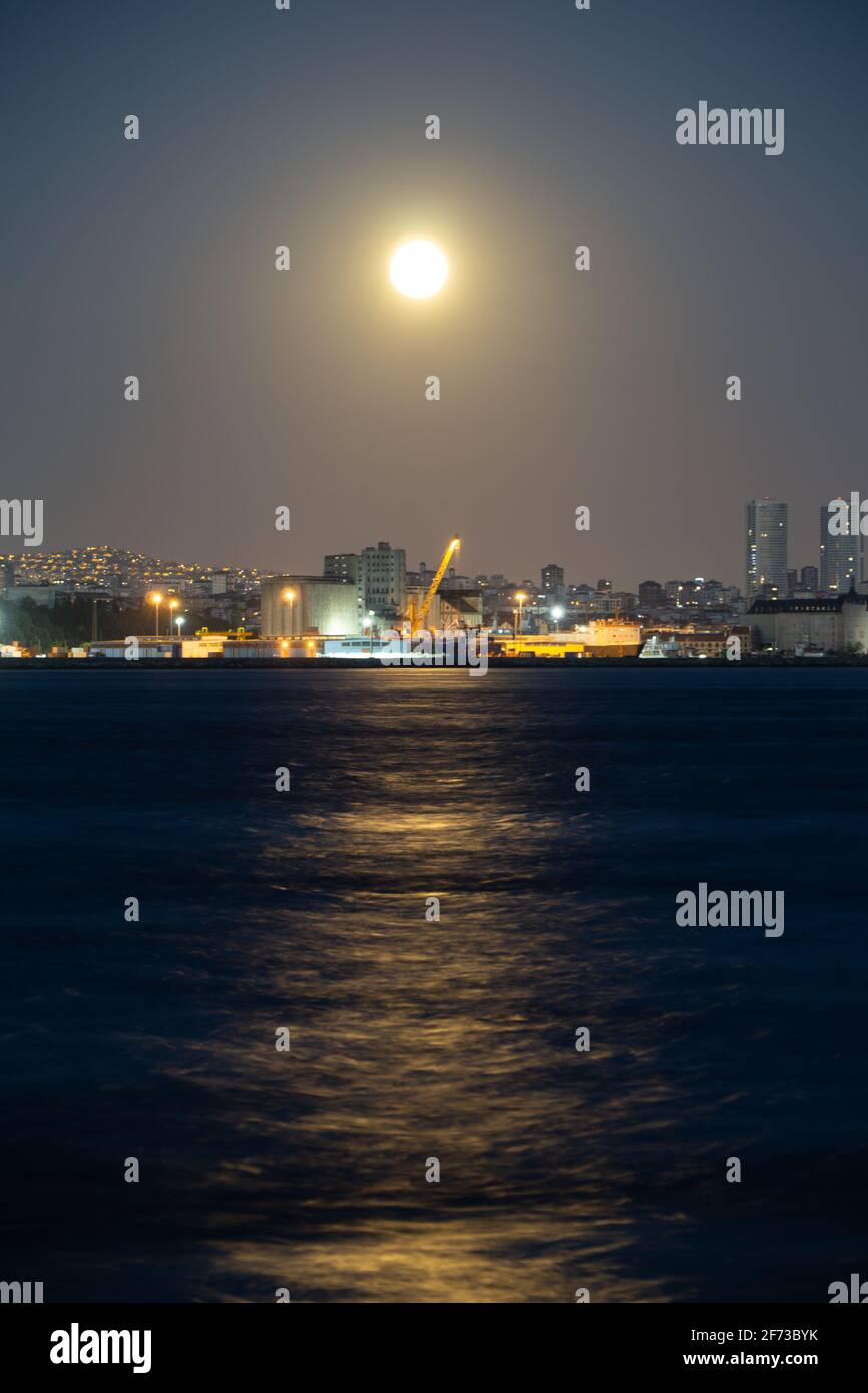 full moon rising over Istanbul skyline Stock Photo - Alamy