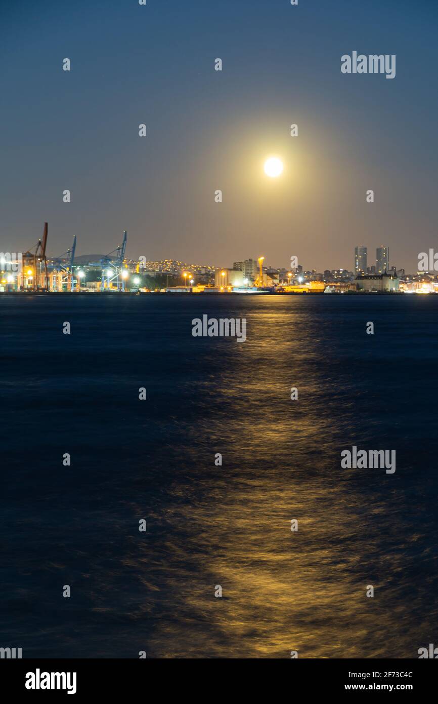 full moon rising over Istanbul skyline Stock Photo - Alamy