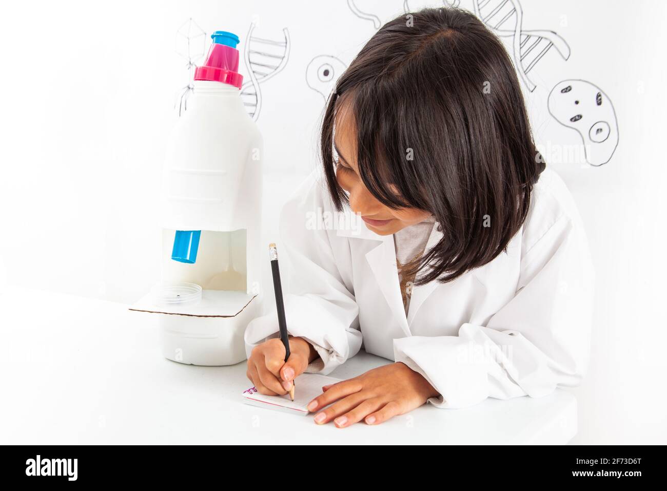 Young girl playing a life sciences professional role. Could be ...