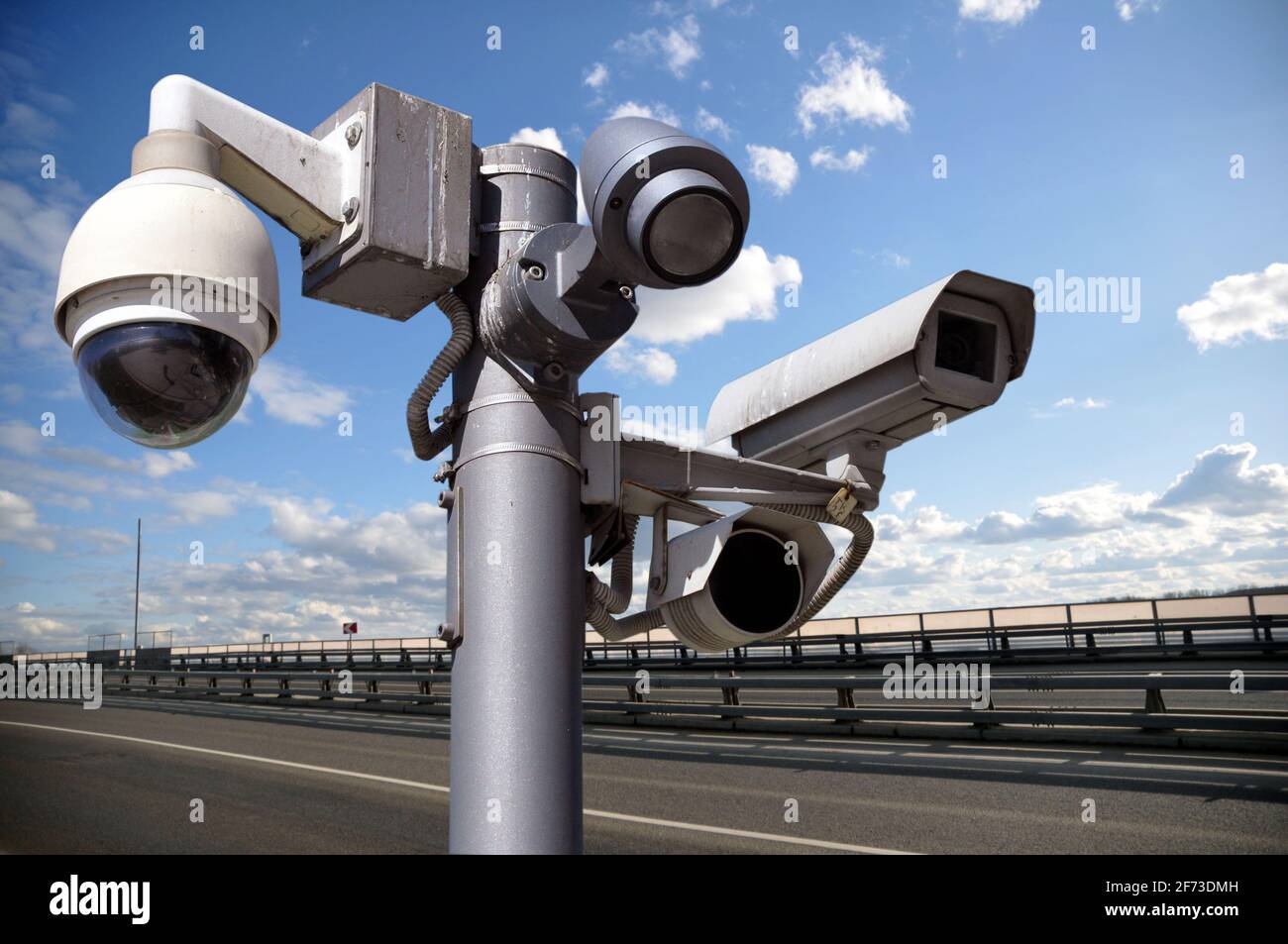CCTV Security Camera or surveillance operating on traffic road and ...