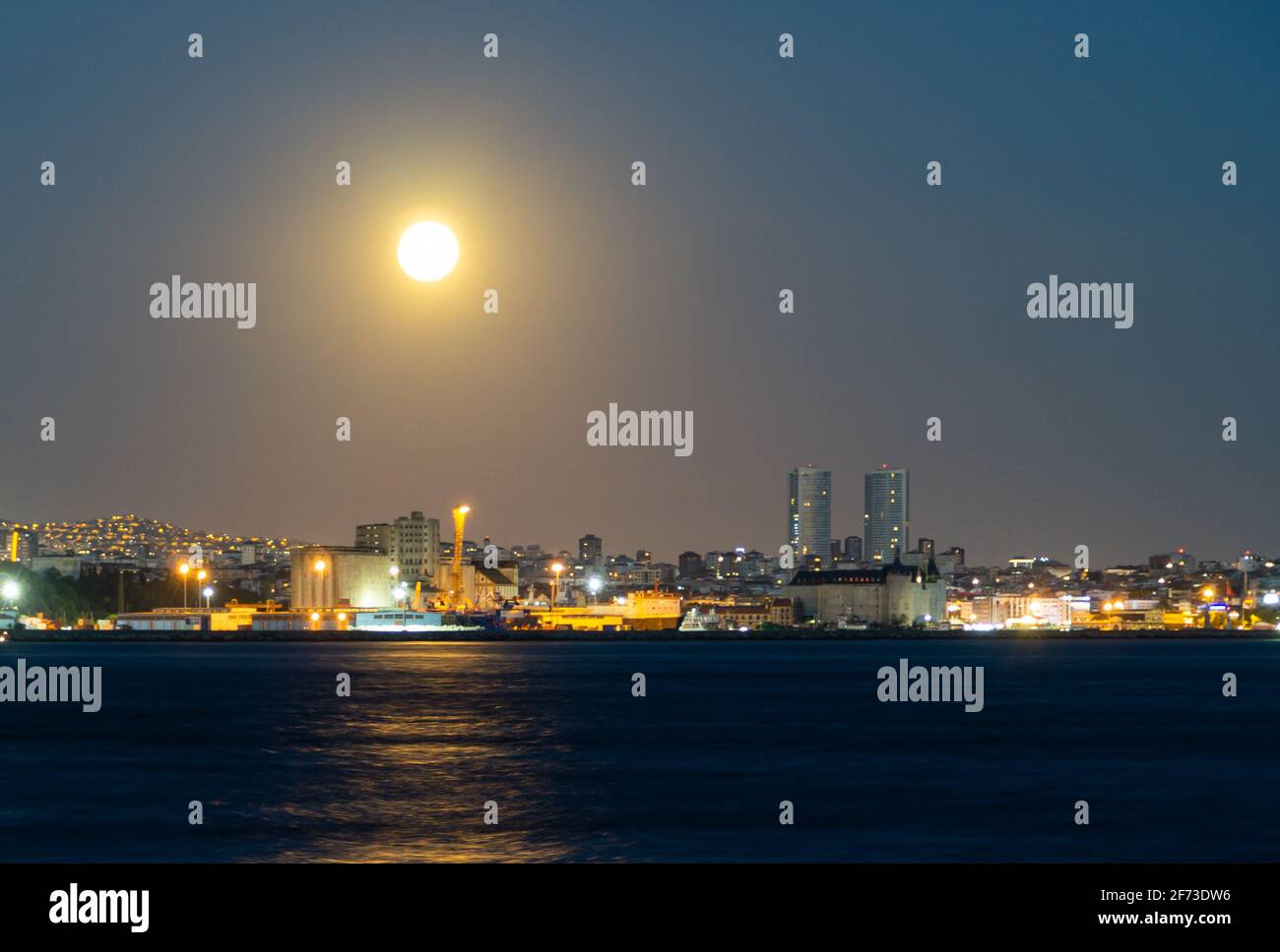 full moon rising over Istanbul skyline Stock Photo - Alamy