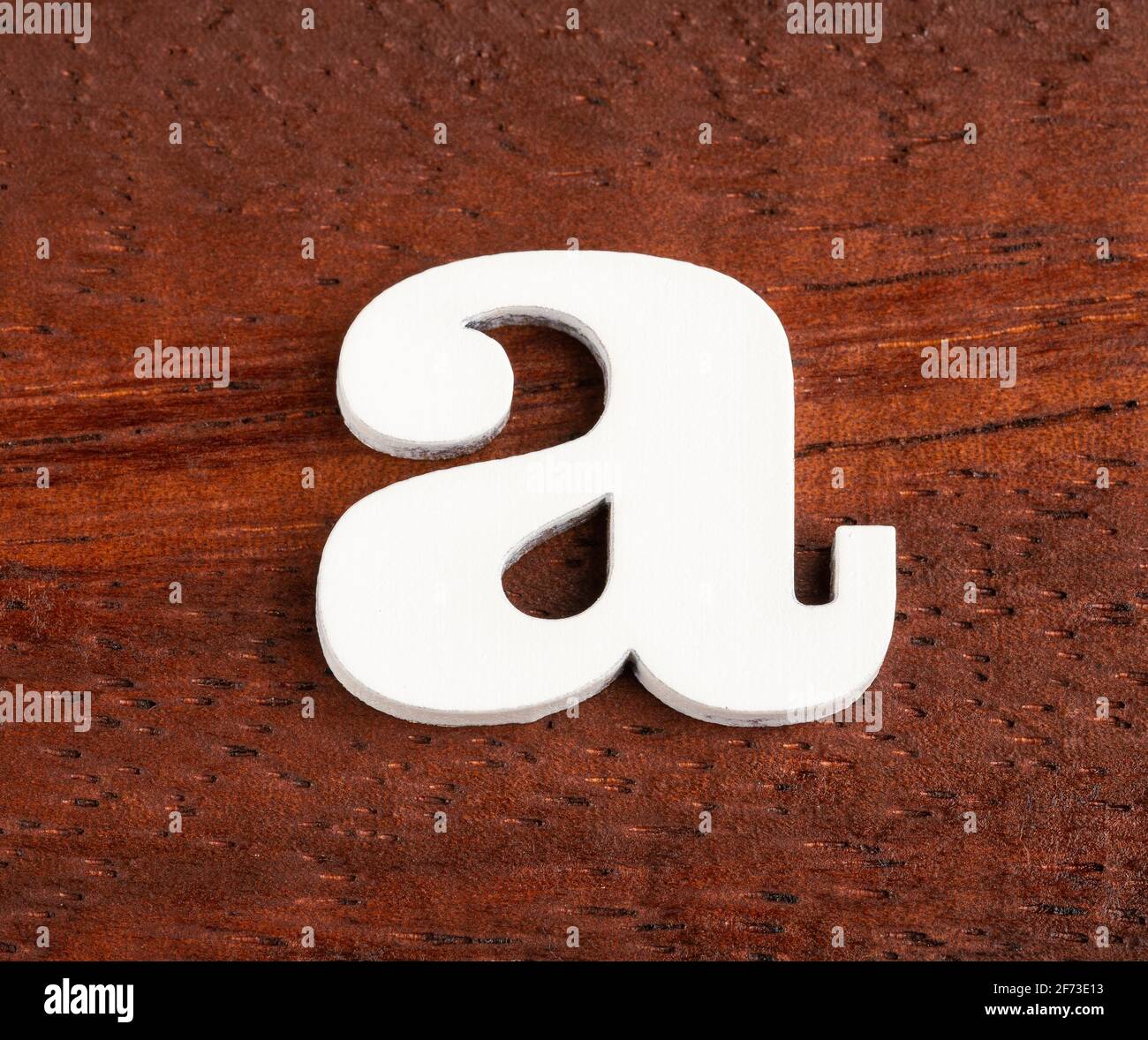 a - lowercase letter. Piece in wood Stock Photo - Alamy