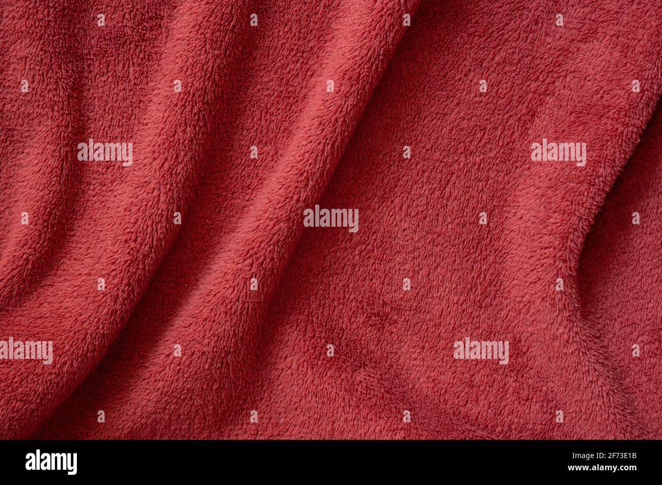 Plush wavy red texture. Macro photo. Fabric background Stock Photo - Alamy