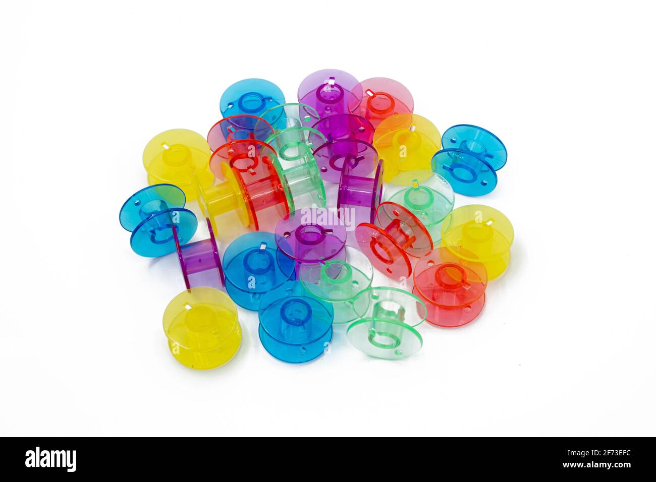 Colorful bobbin sewing machine Stock Photo - Alamy