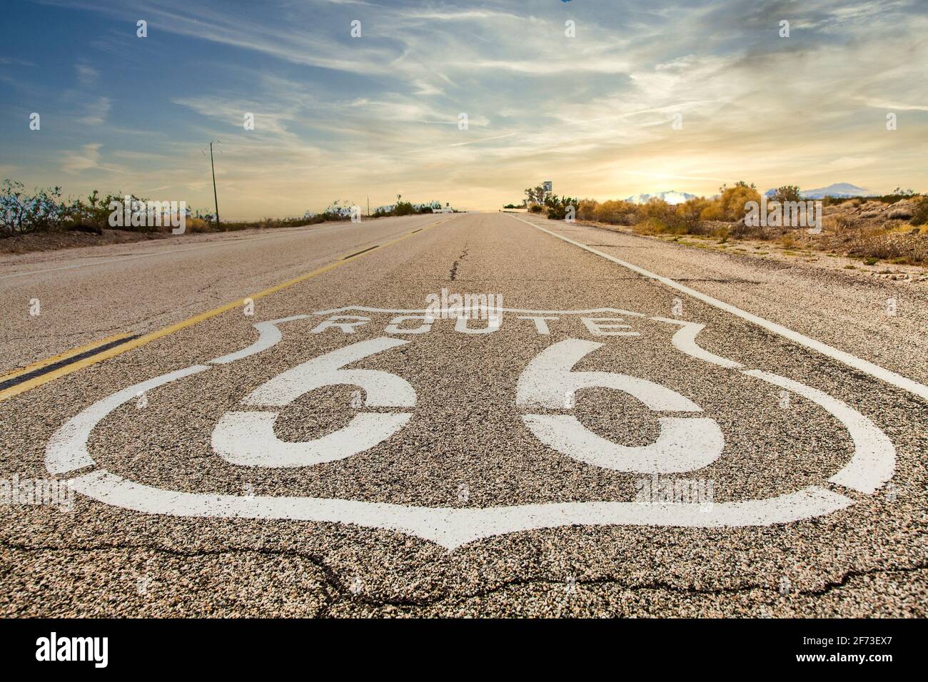 Route 66 road sign with blue sky background. Historic street with ...