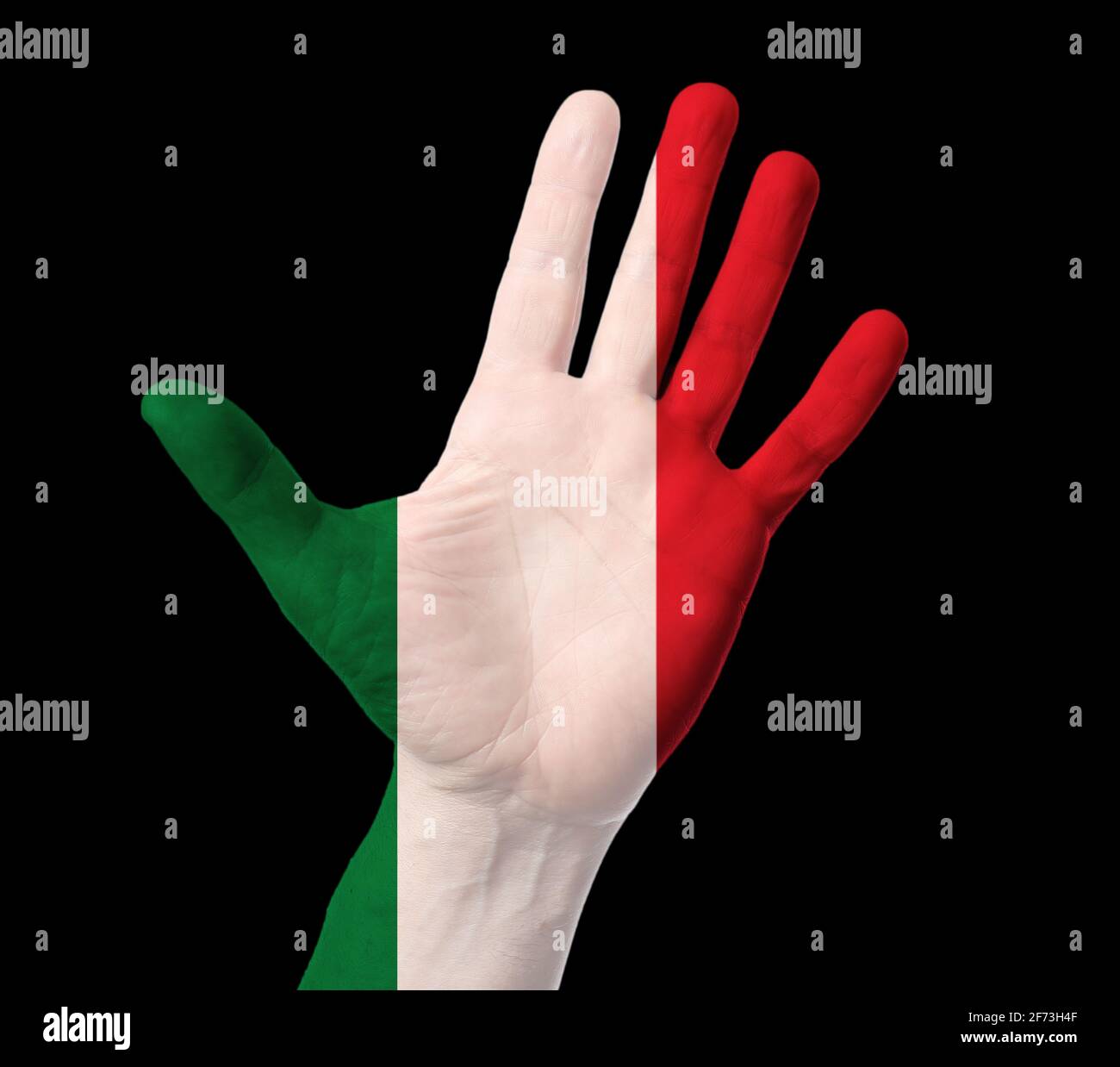 Hand in colors of Italian flag on black background Stock Photo - Alamy