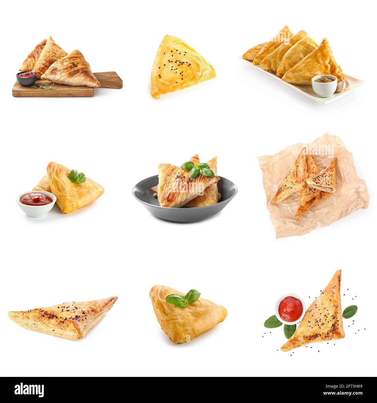 Set of delicious samosas on white background Stock Photo - Alamy