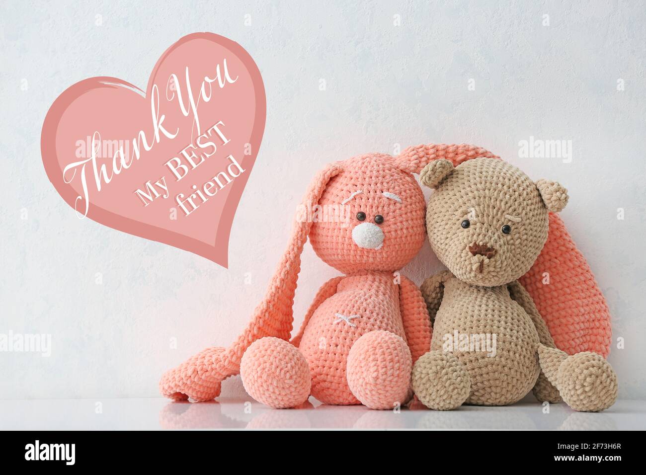 Cuddly toys on white background. Friendship Day celebration Stock Photo ...