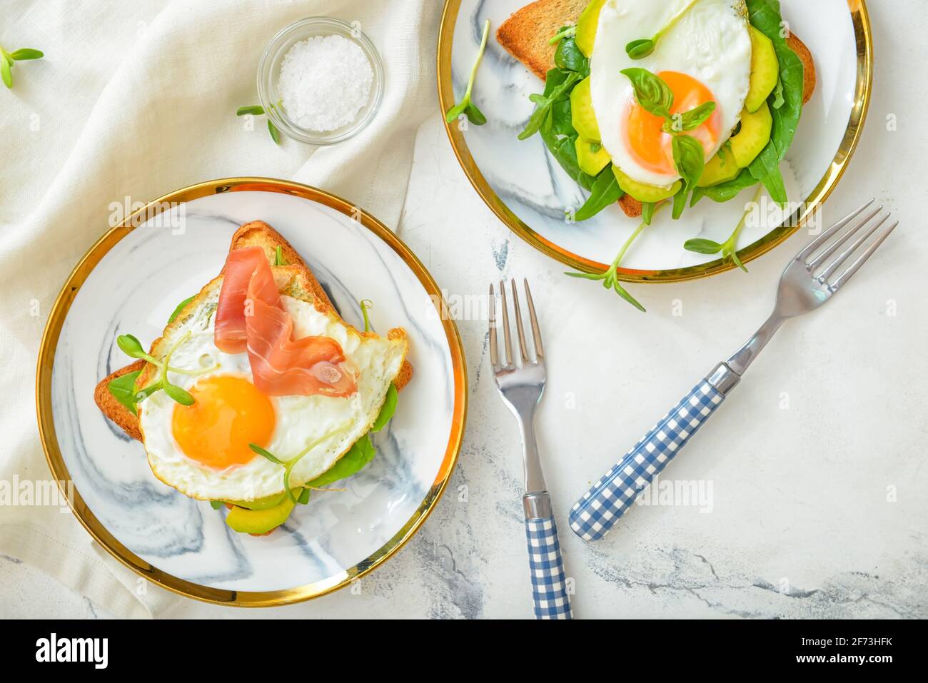 Plates with tasty sandwiches on white background Stock Photo - Alamy