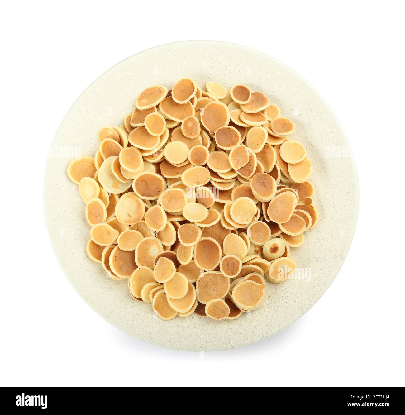 Plate with tasty mini pancakes on white background Stock Photo - Alamy