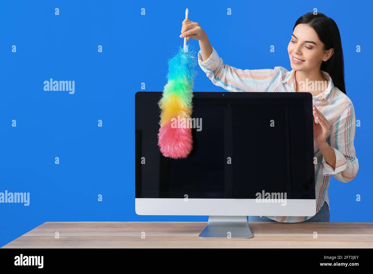 Woman wiping screen computer hi-res stock photography and images - Alamy