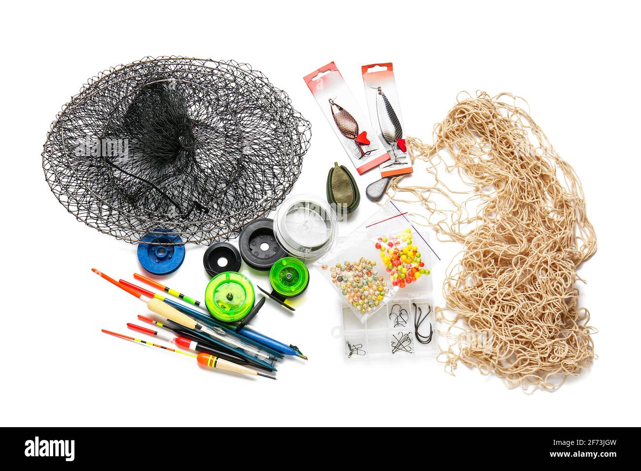 Different fishing equipment on white background Stock Photo - Alamy