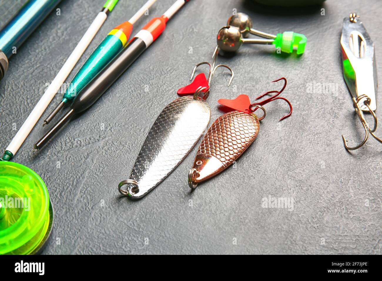 Different fishing equipment on dark background, closeup Stock Photo - Alamy