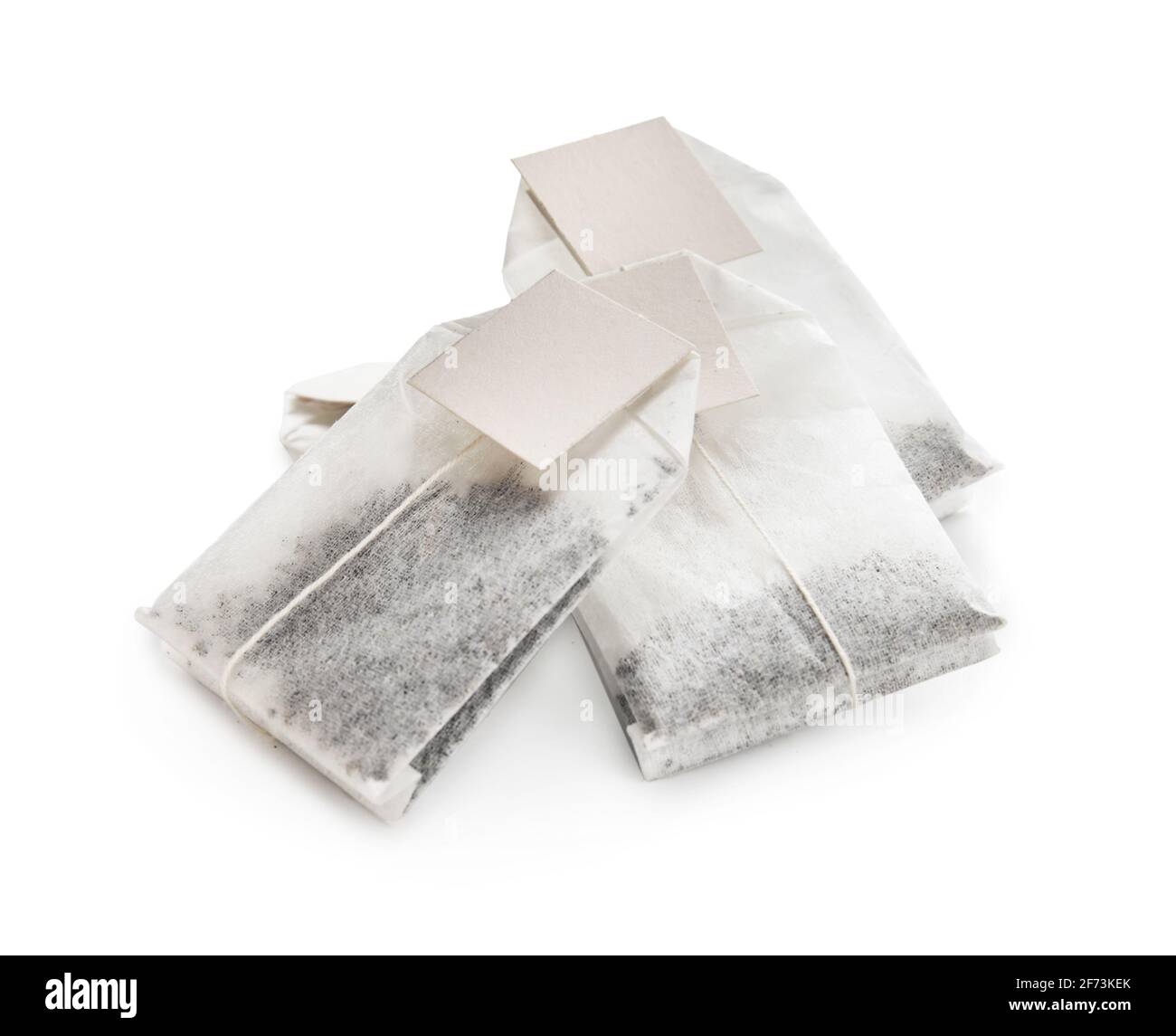 Tea bags on white background Stock Photo - Alamy