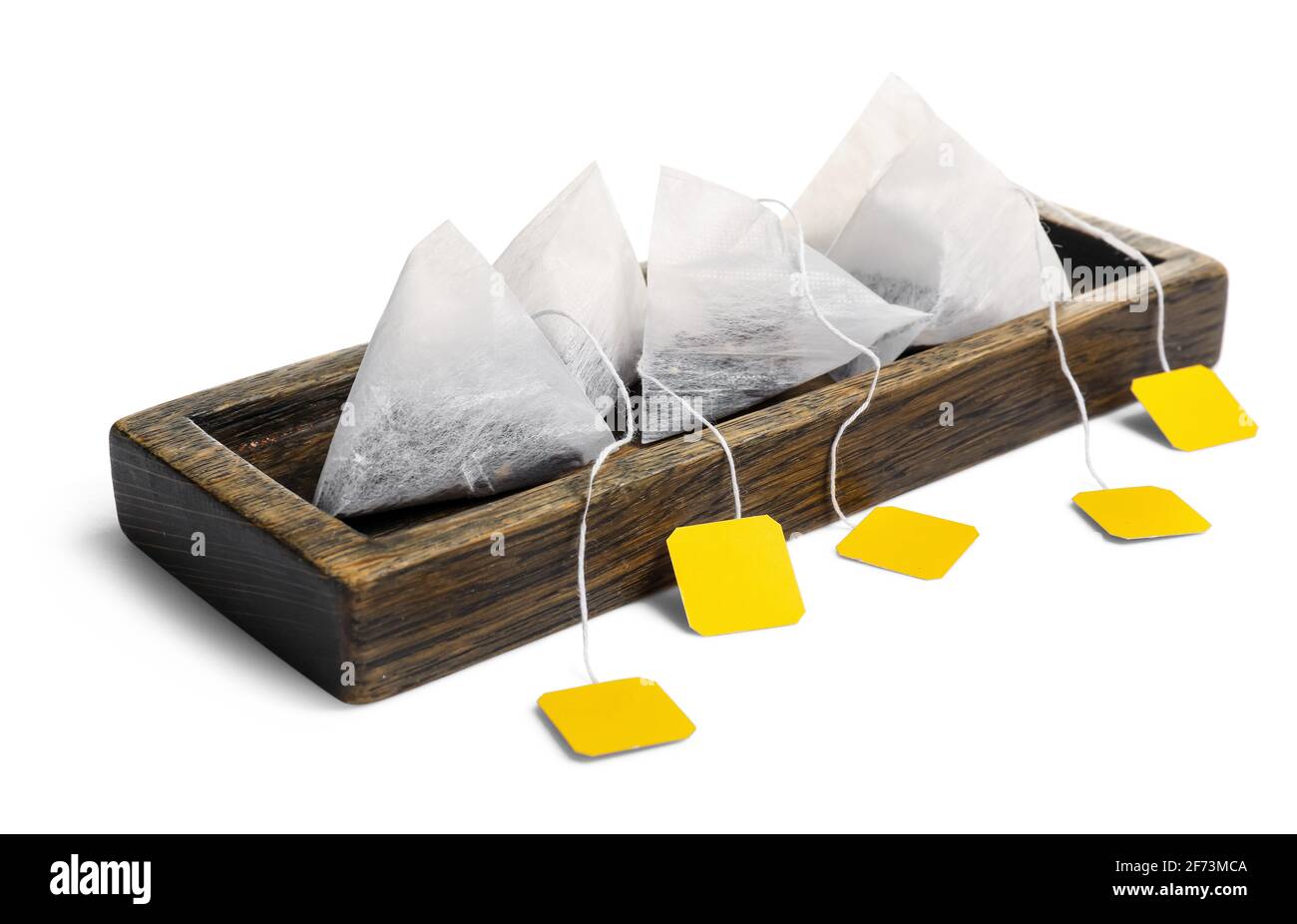 Tray with tea bags on white background Stock Photo - Alamy