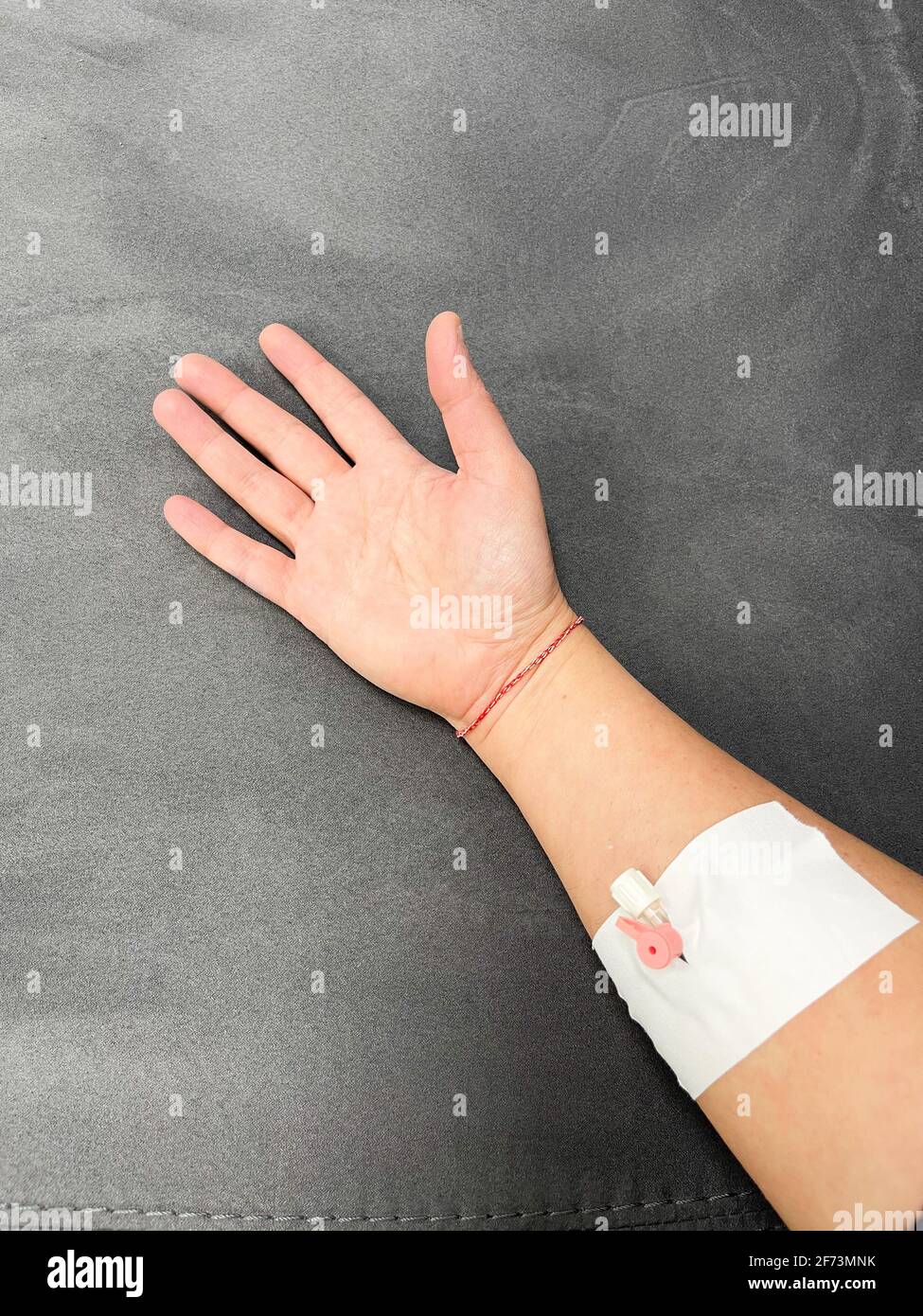 Patient intravenous drip in arm hi-res stock photography and images - Alamy