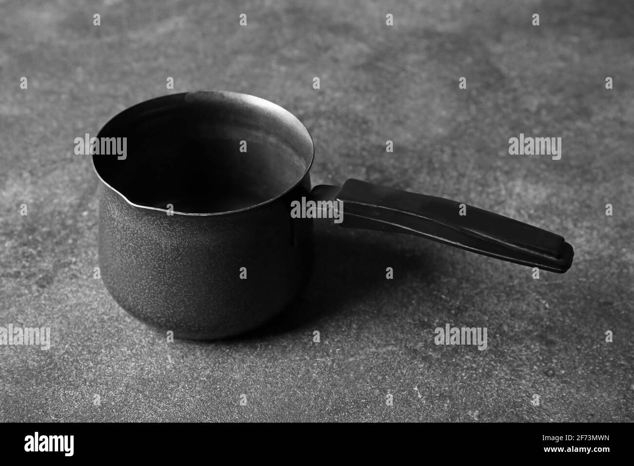 Cooking pot on dark background Stock Photo - Alamy