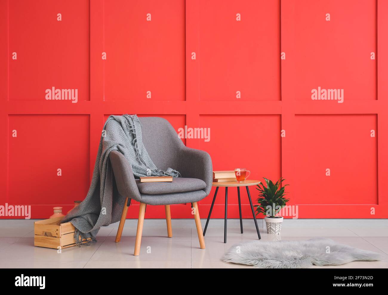 Interior of modern living room with armchair Stock Photo - Alamy