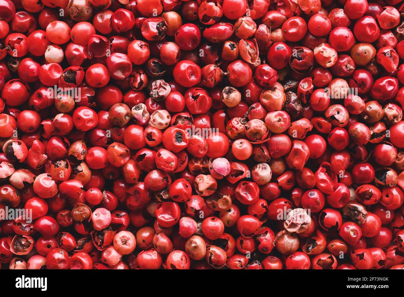 Texture of red peppercorns as background Stock Photo - Alamy