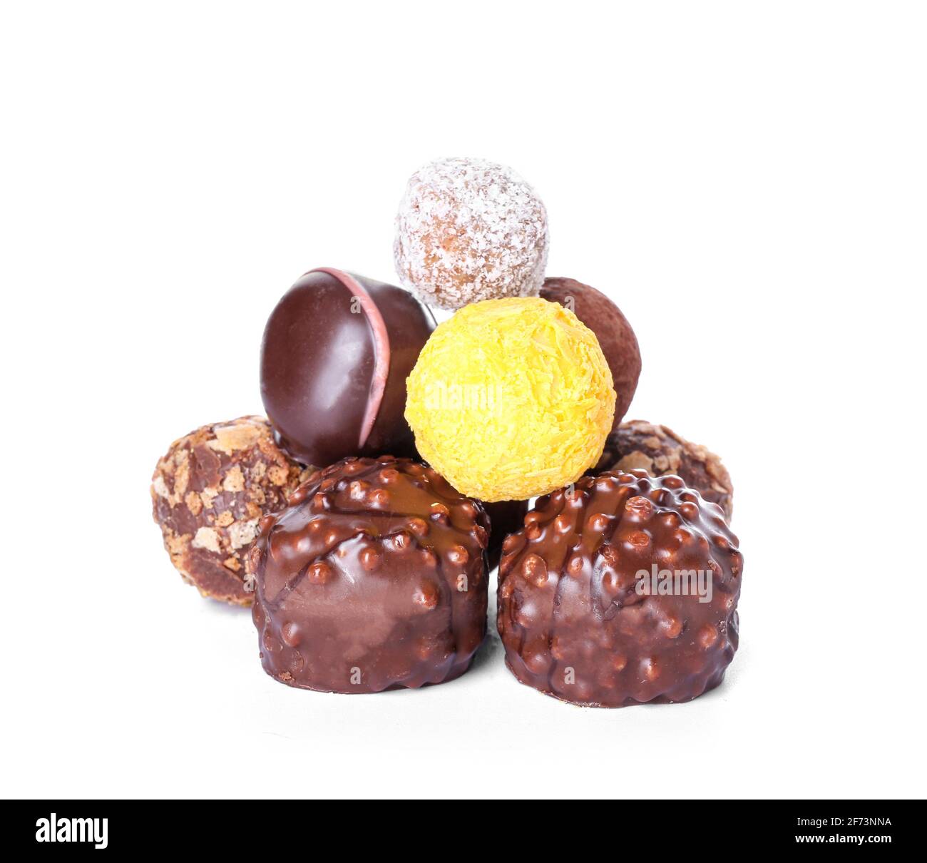 Sweet chocolate candies on white background Stock Photo - Alamy