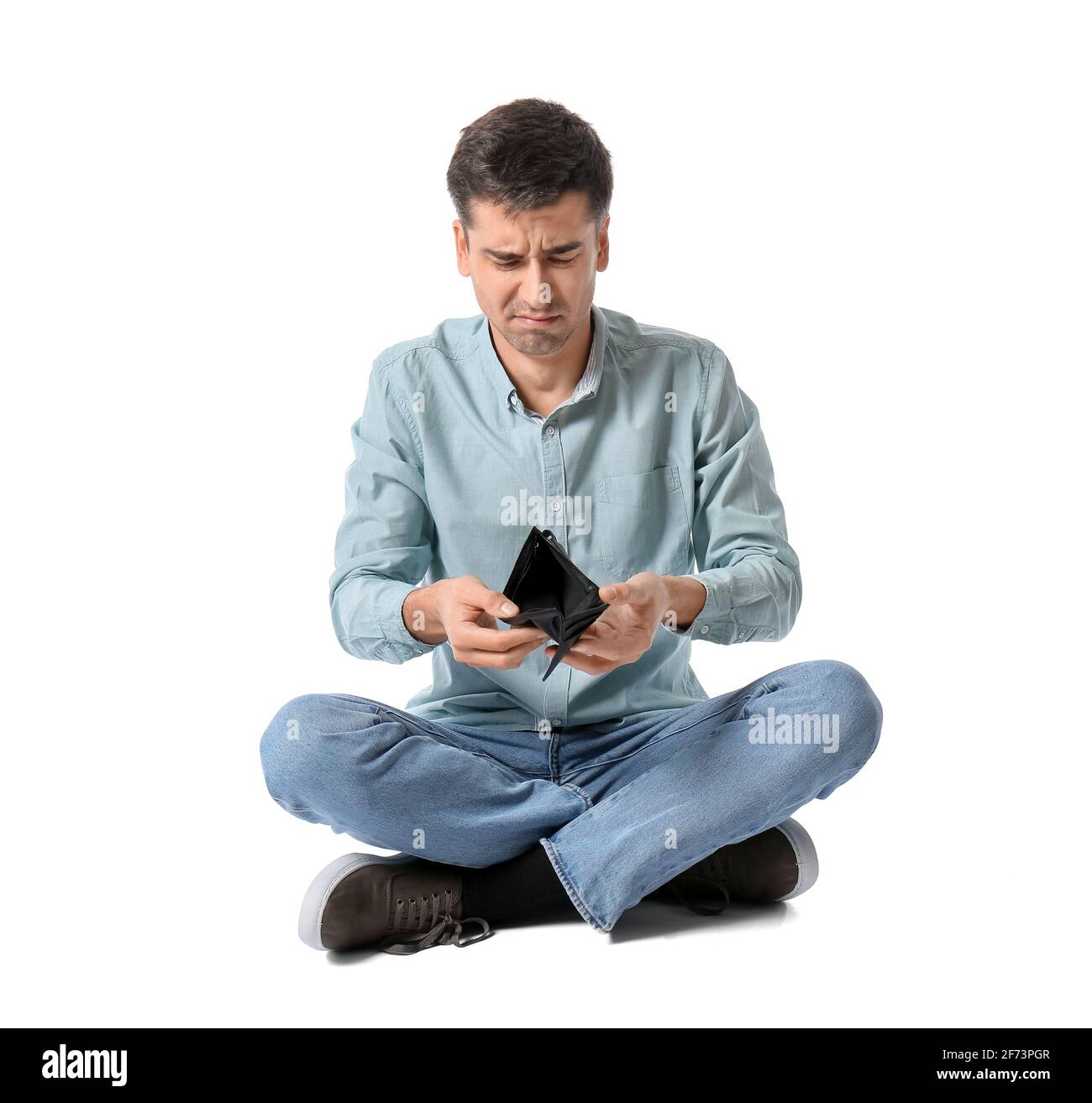 Sad man with empty wallet on white background. Bankruptcy concept Stock ...