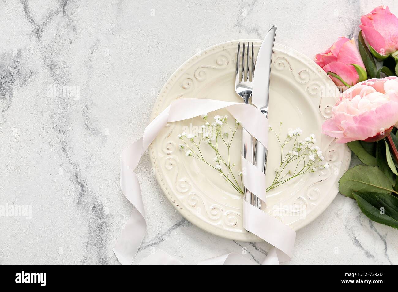 Beautiful table setting on white background Stock Photo - Alamy