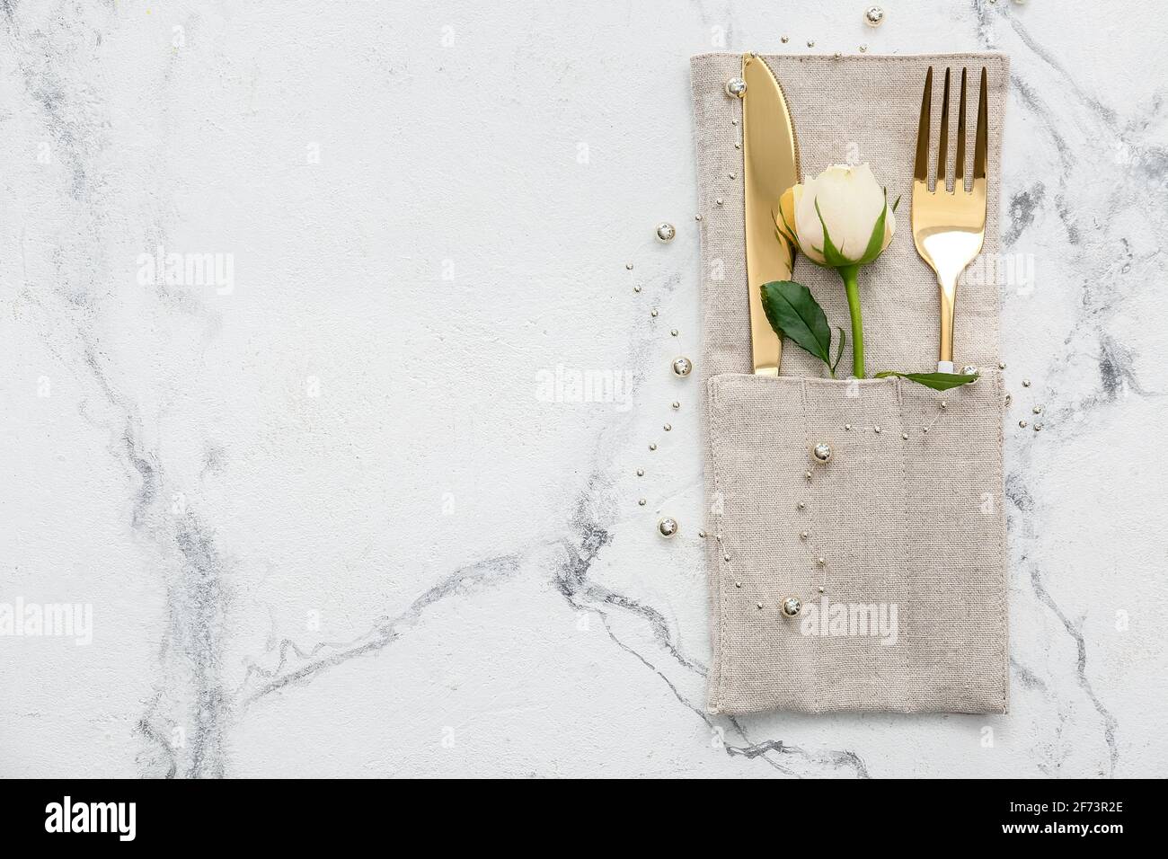Beautiful table setting on white background Stock Photo - Alamy