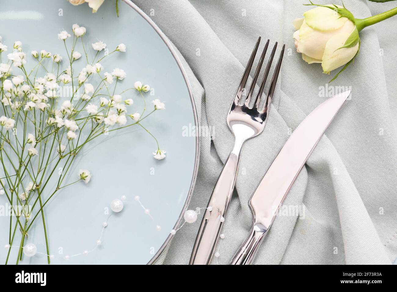 Beautiful table setting with flowers, top view Stock Photo - Alamy