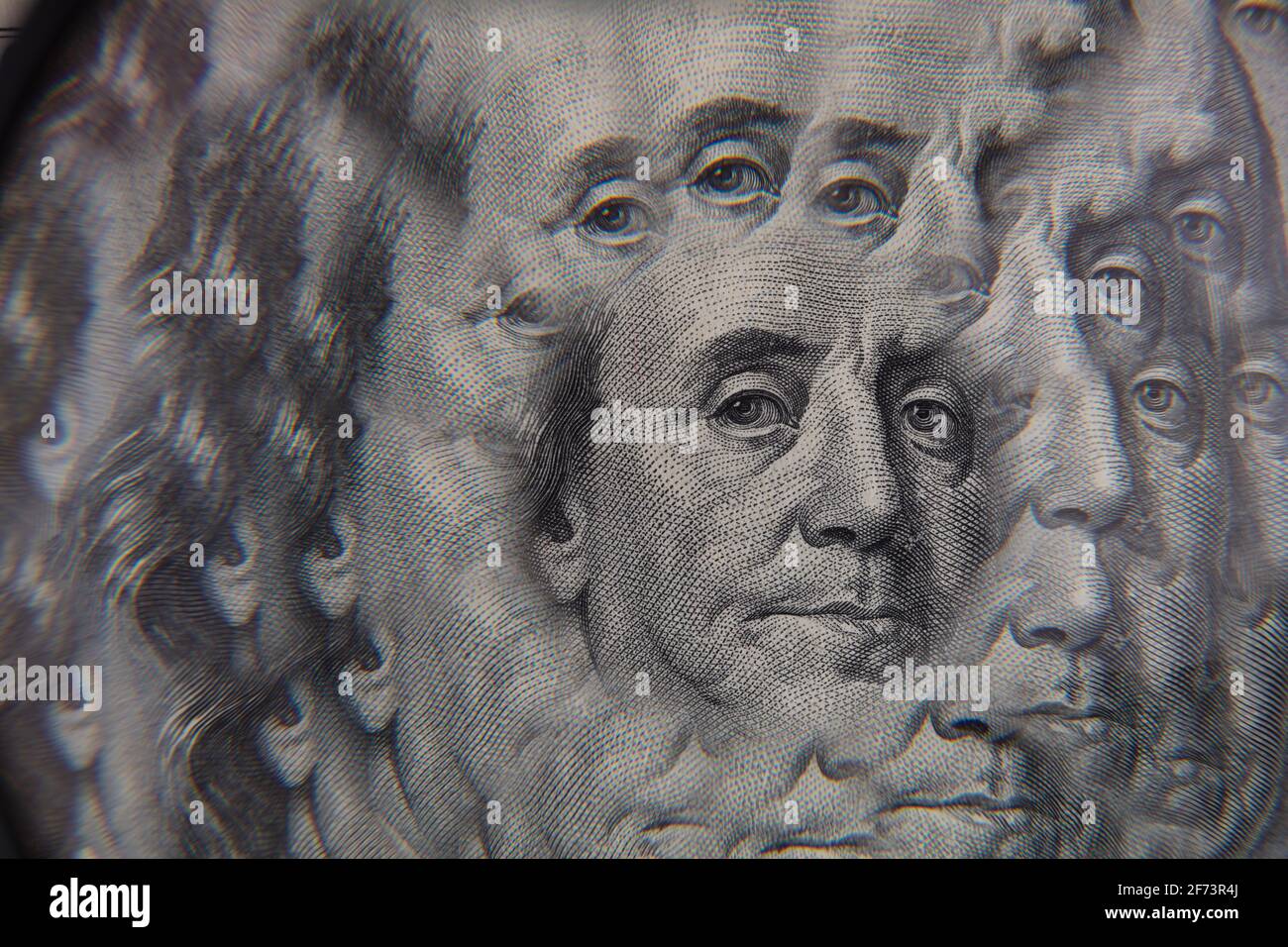 Benjamin Franklin from US 100 dollar banknote through kaleidoscope ...