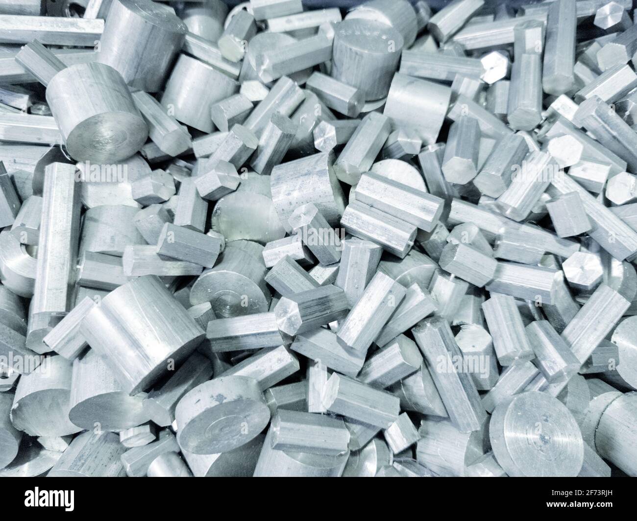heap of short leftovers of hexagonal and round long products of steel ...