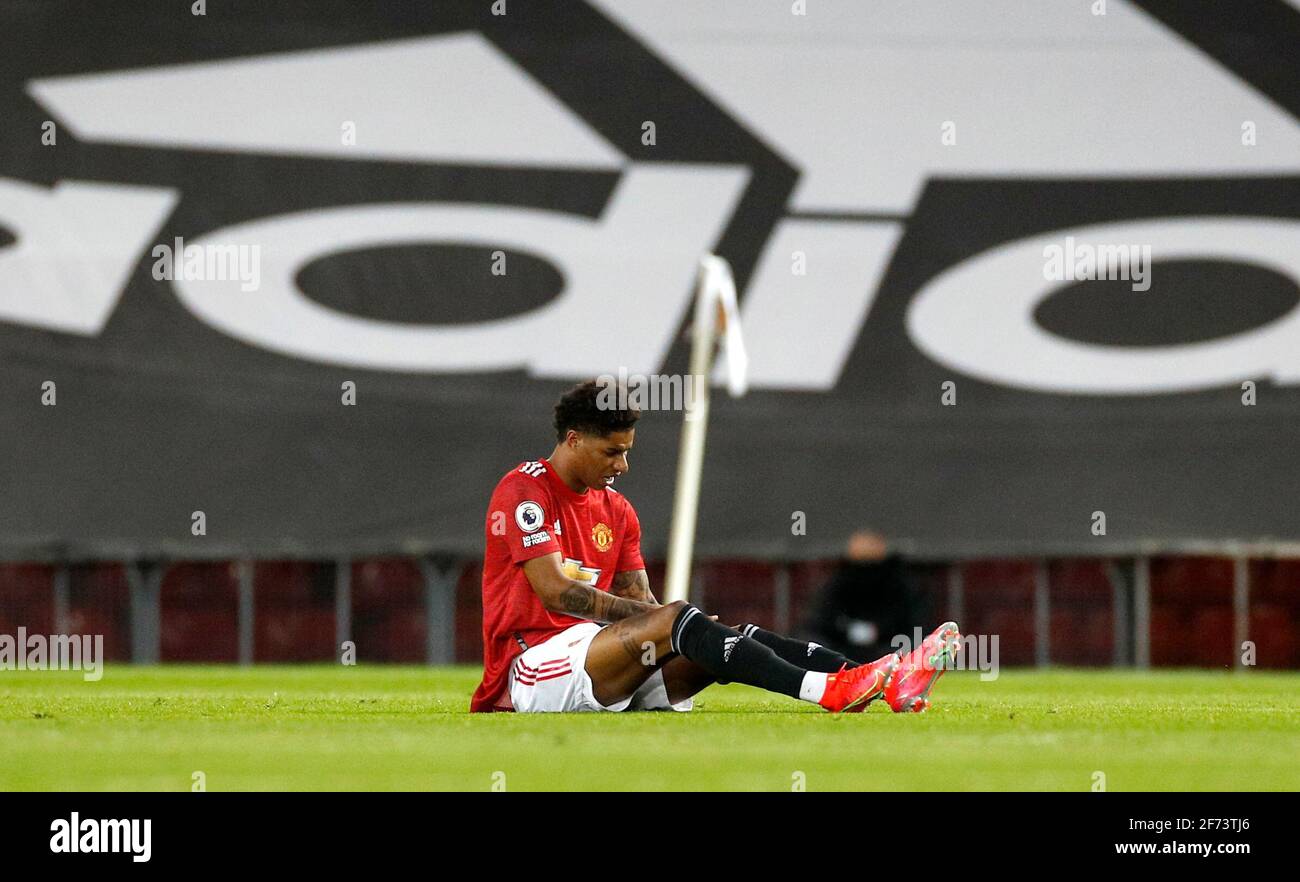 Manchester United's Marcus Rashford reacts in pain during the Premier ...