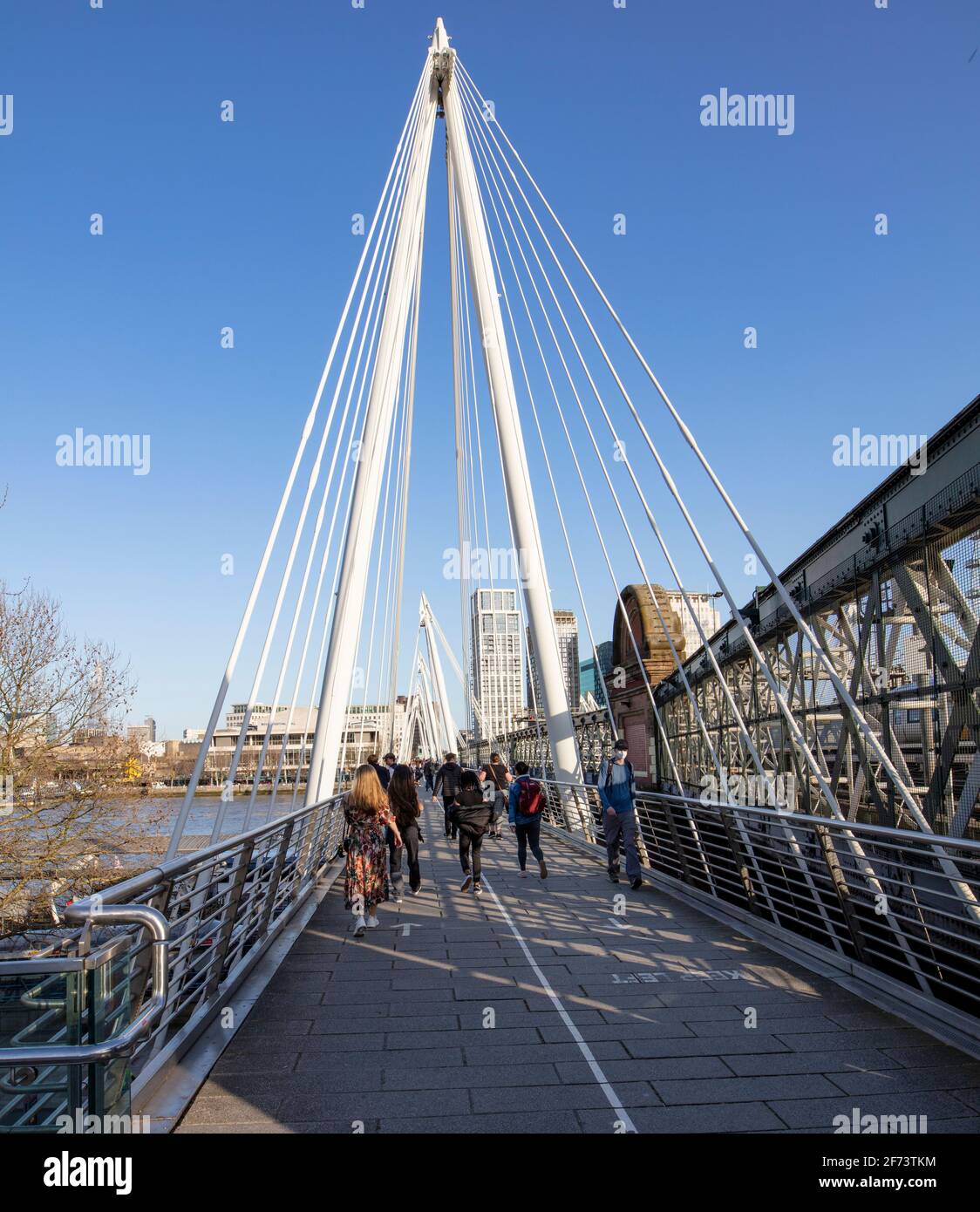 Hungerford Bridge walkway across the Thames in London. Owned by Network ...