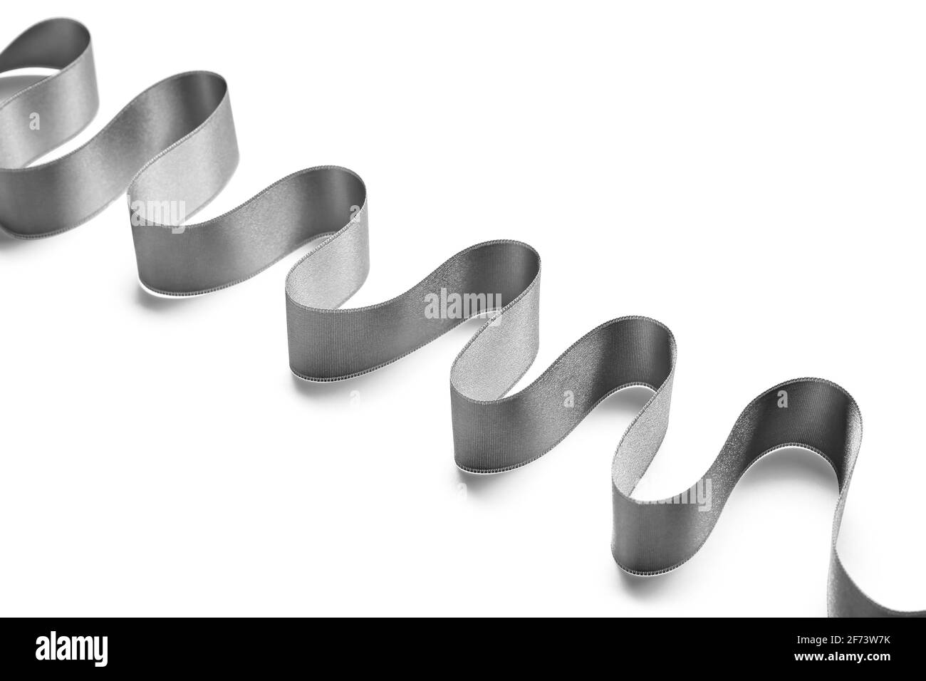 Silver ribbon on white background Stock Photo - Alamy