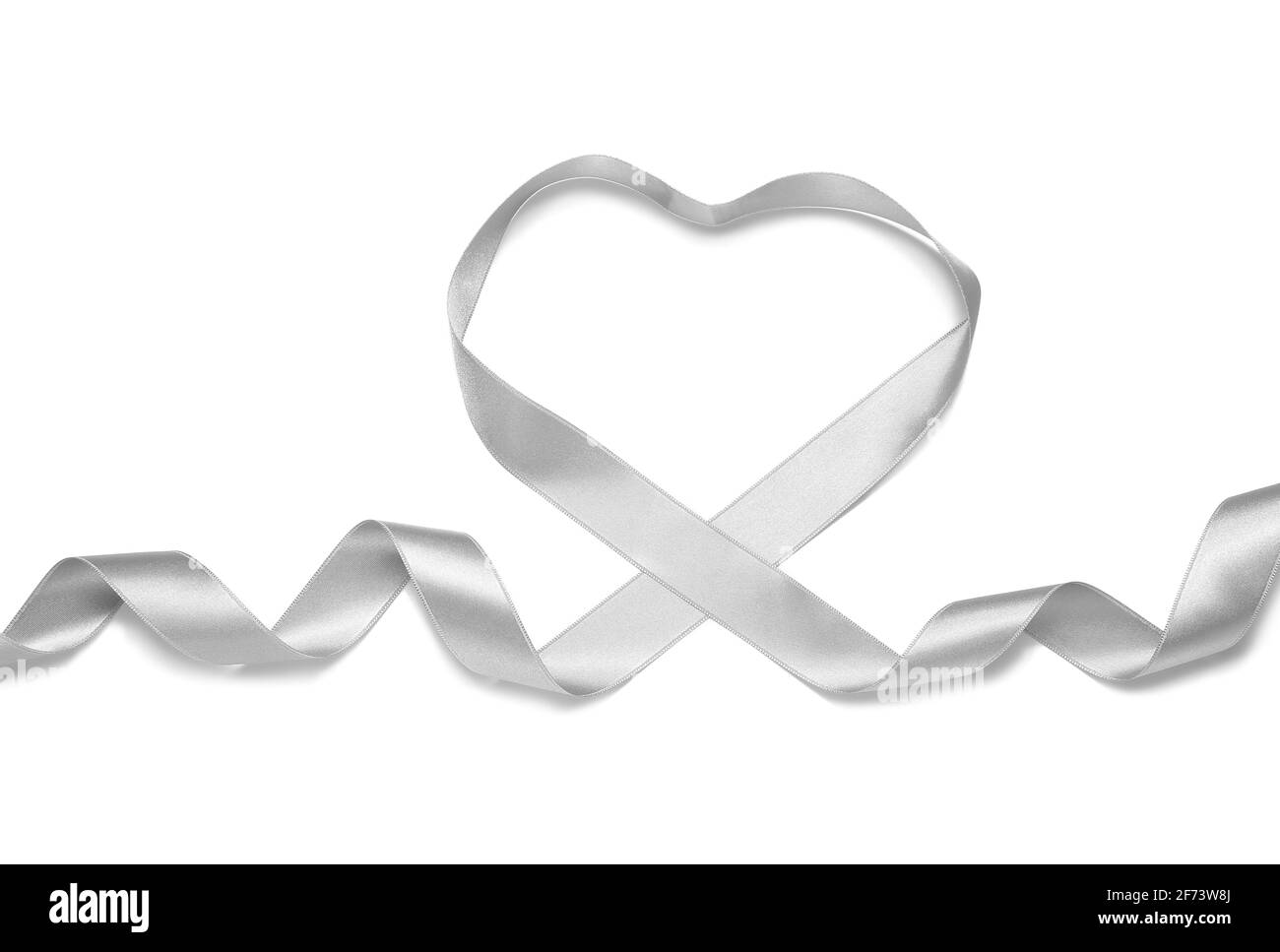 Heart shape made of silver ribbon on white background Stock Photo - Alamy