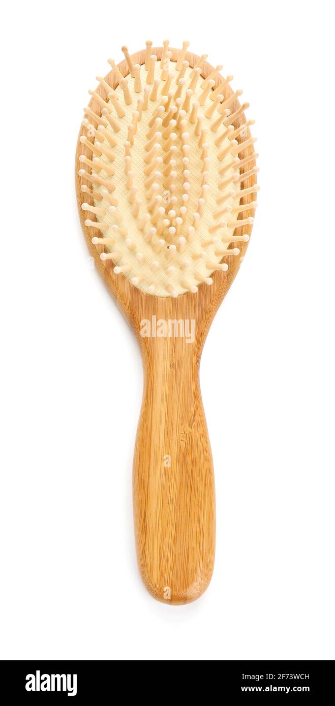 Wooden hair brush on white background Stock Photo - Alamy