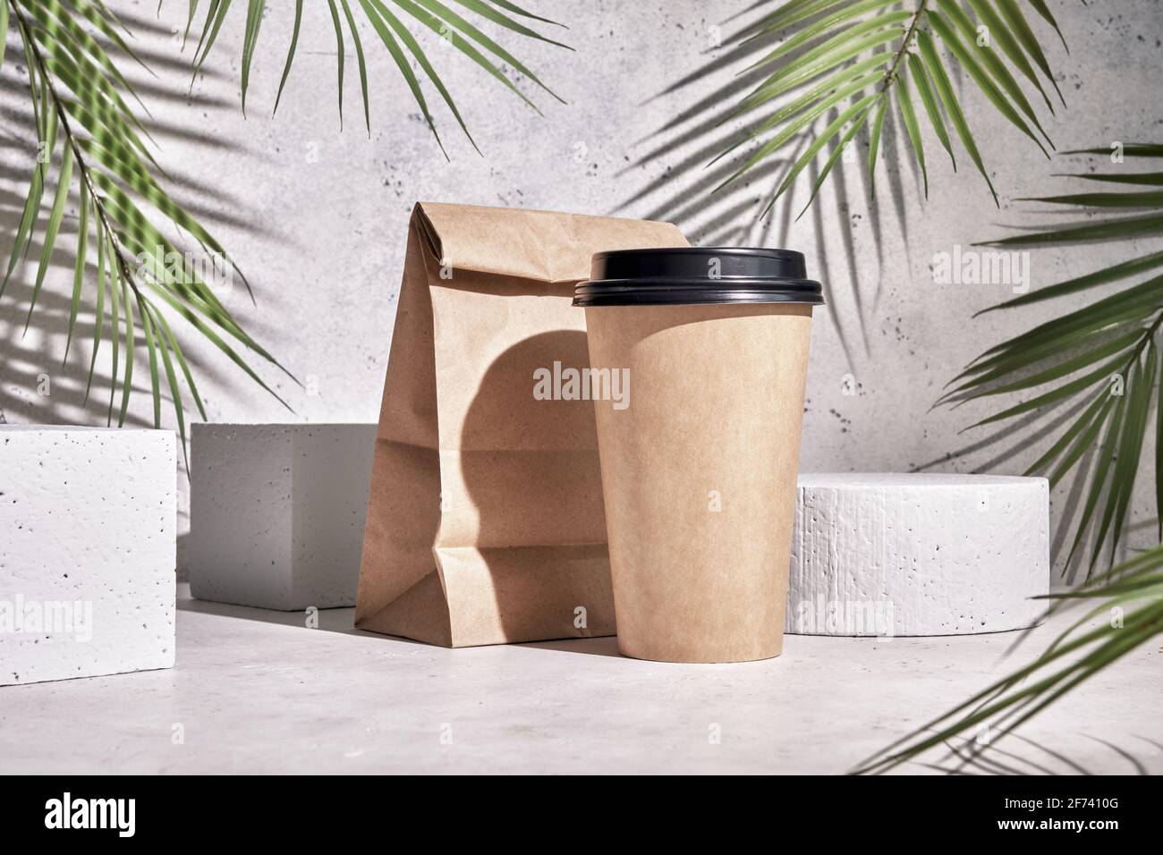 Take out coffee. Paper cup of coffee on grey background Stock Photo - Alamy
