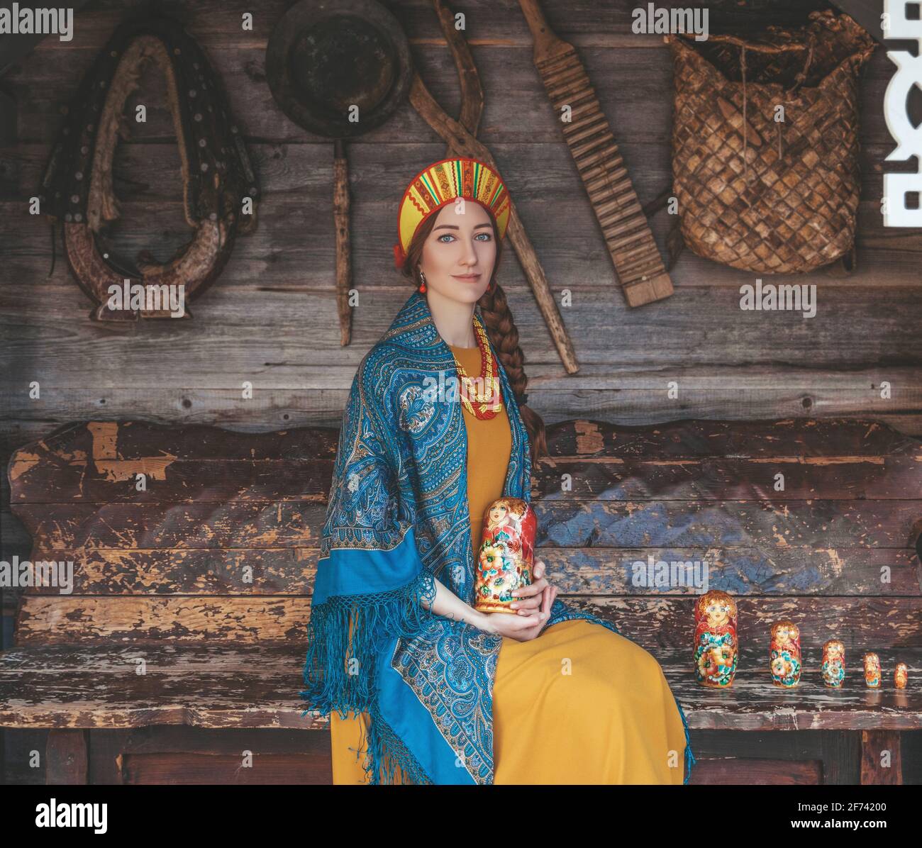 Russian beauty closeup on the traditional background with different ...