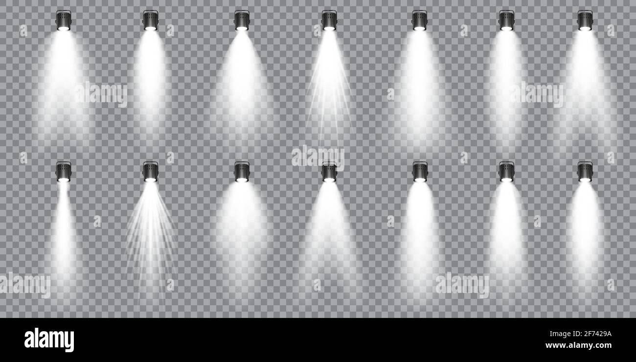 Illuminated studio spotlights collection. Bright light beam ...