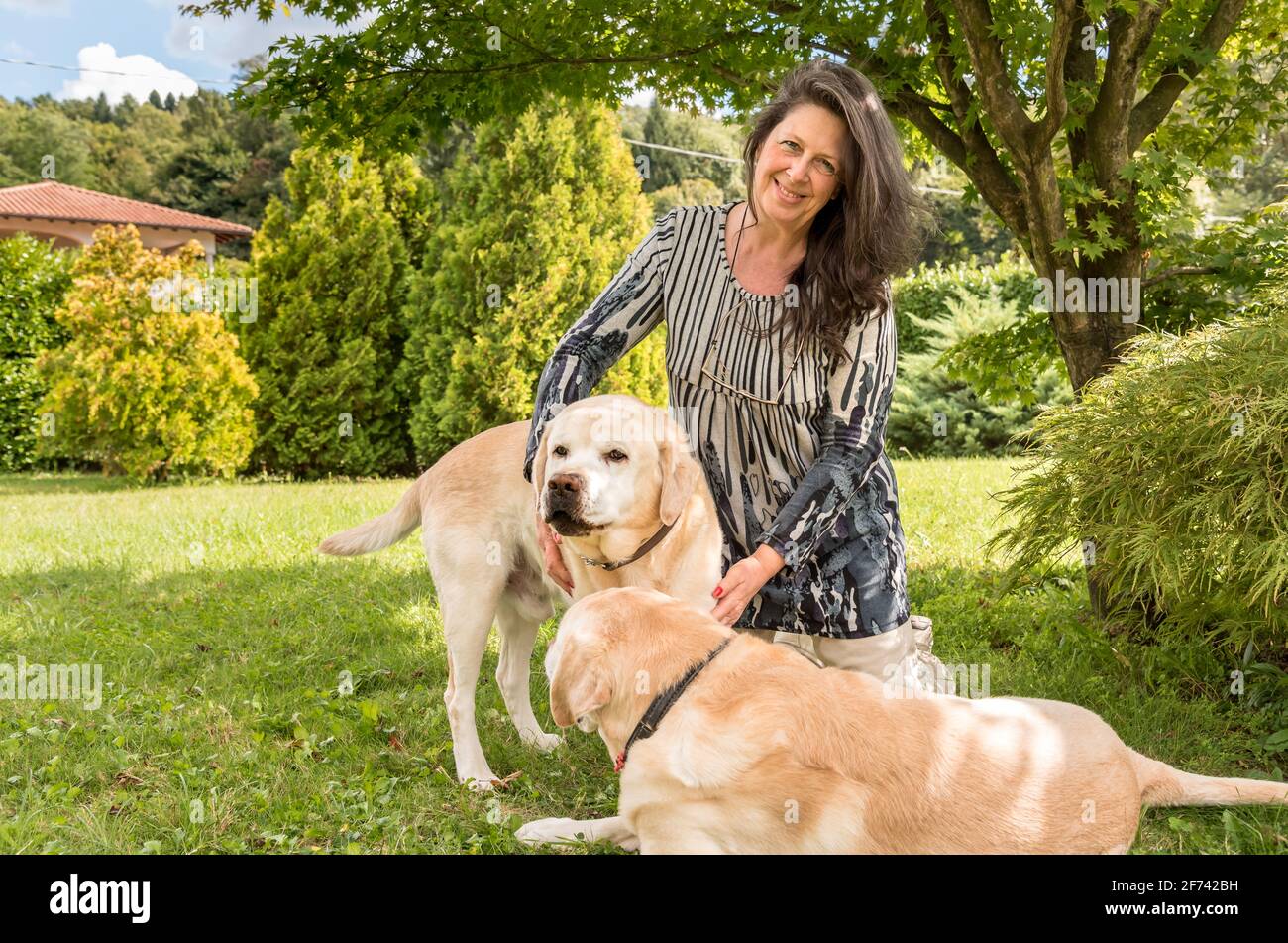 Mature woman and dog hi-res stock photography and images - Alamy