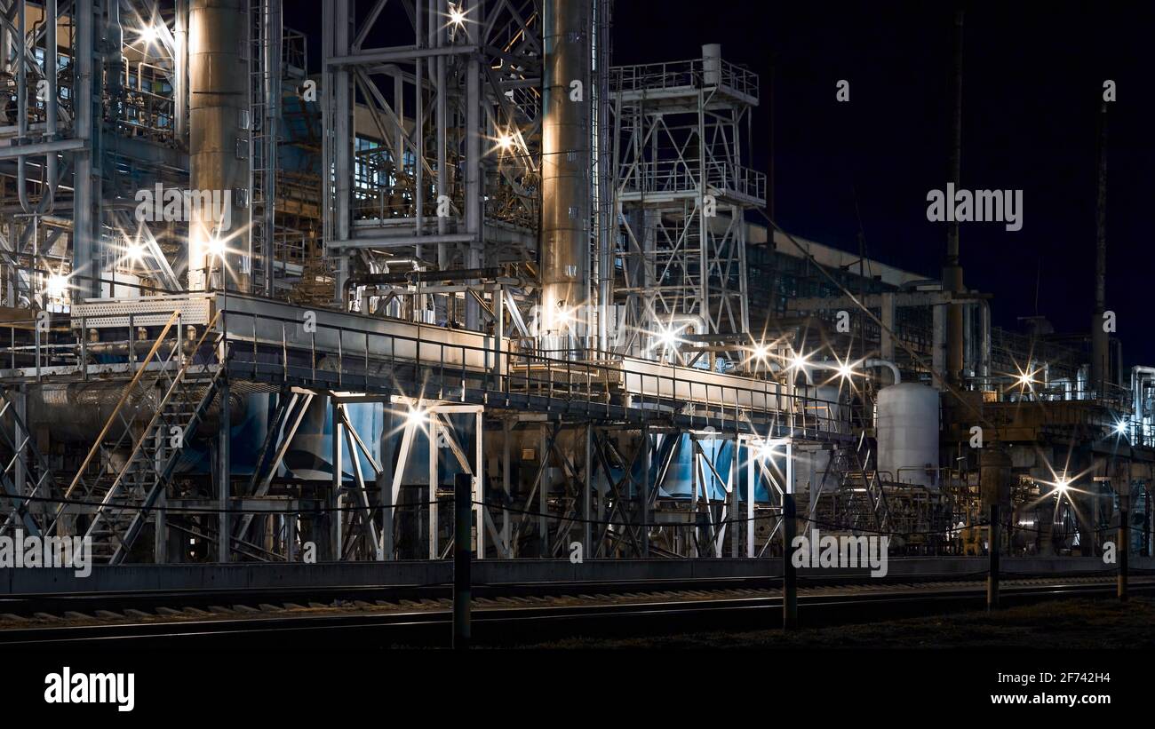 Night industrial petrochemical landscape. Methanol synthesis process ...