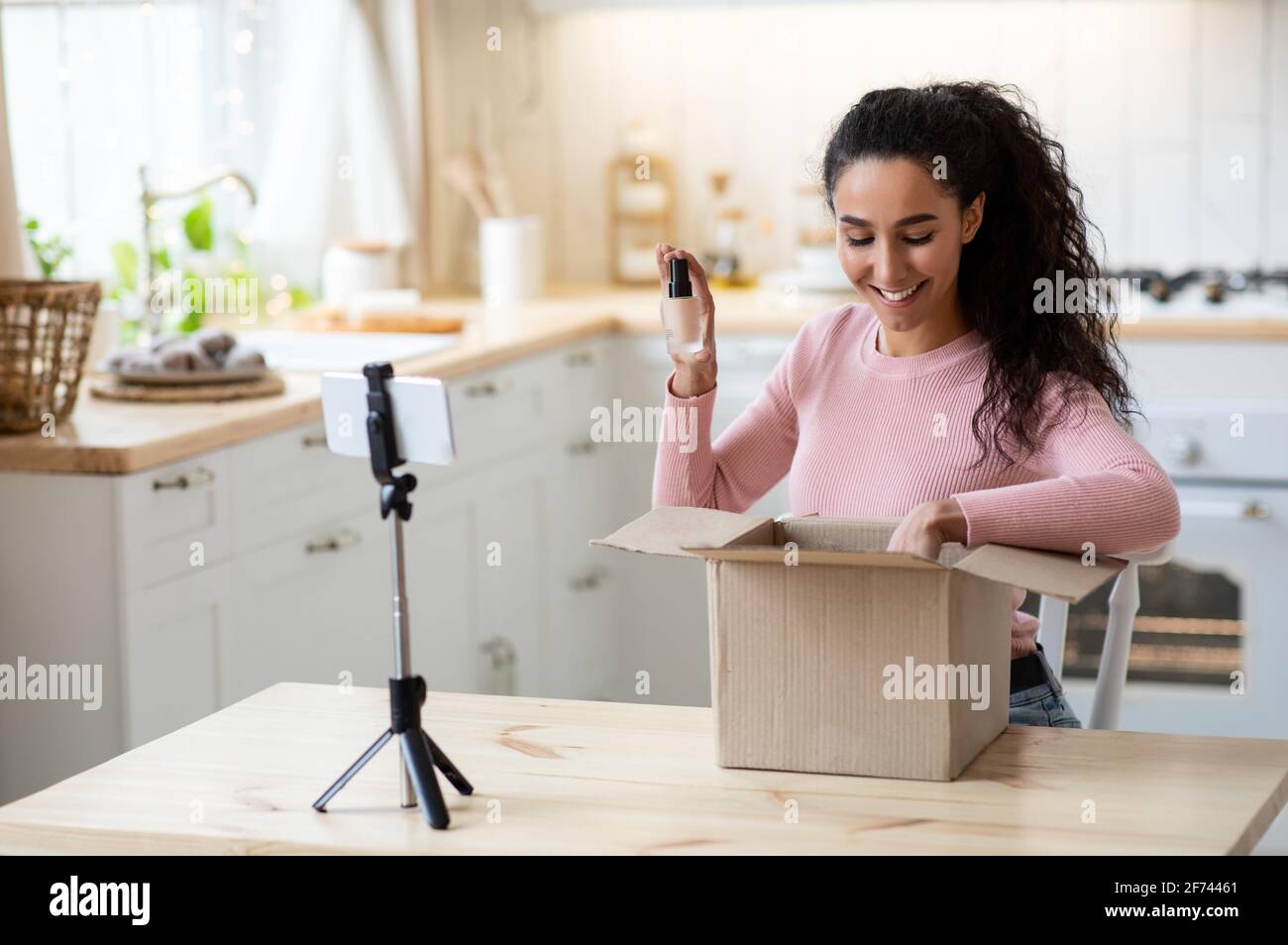 Happy Female Beauty Influencer Unboxing Parcel With New Makeup Products ...