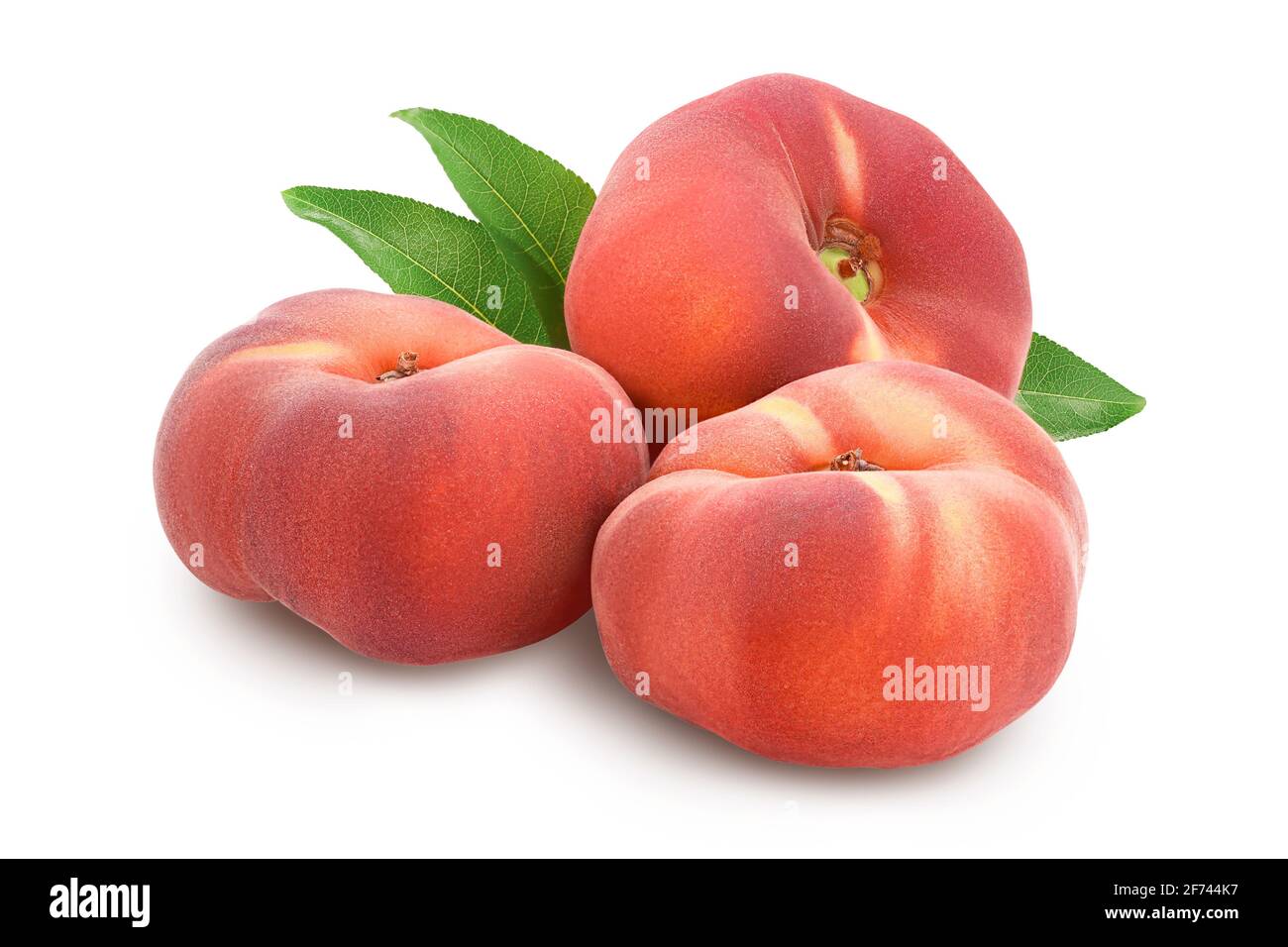 Ripe chinese flat peach fruit with leaf isolated on white background ...