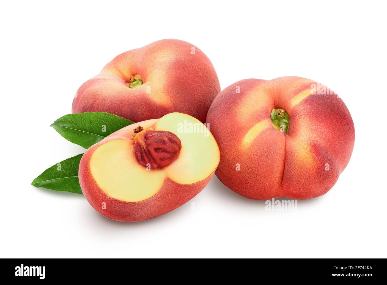Ripe chinese flat peach fruit with leaf isolated on white background ...