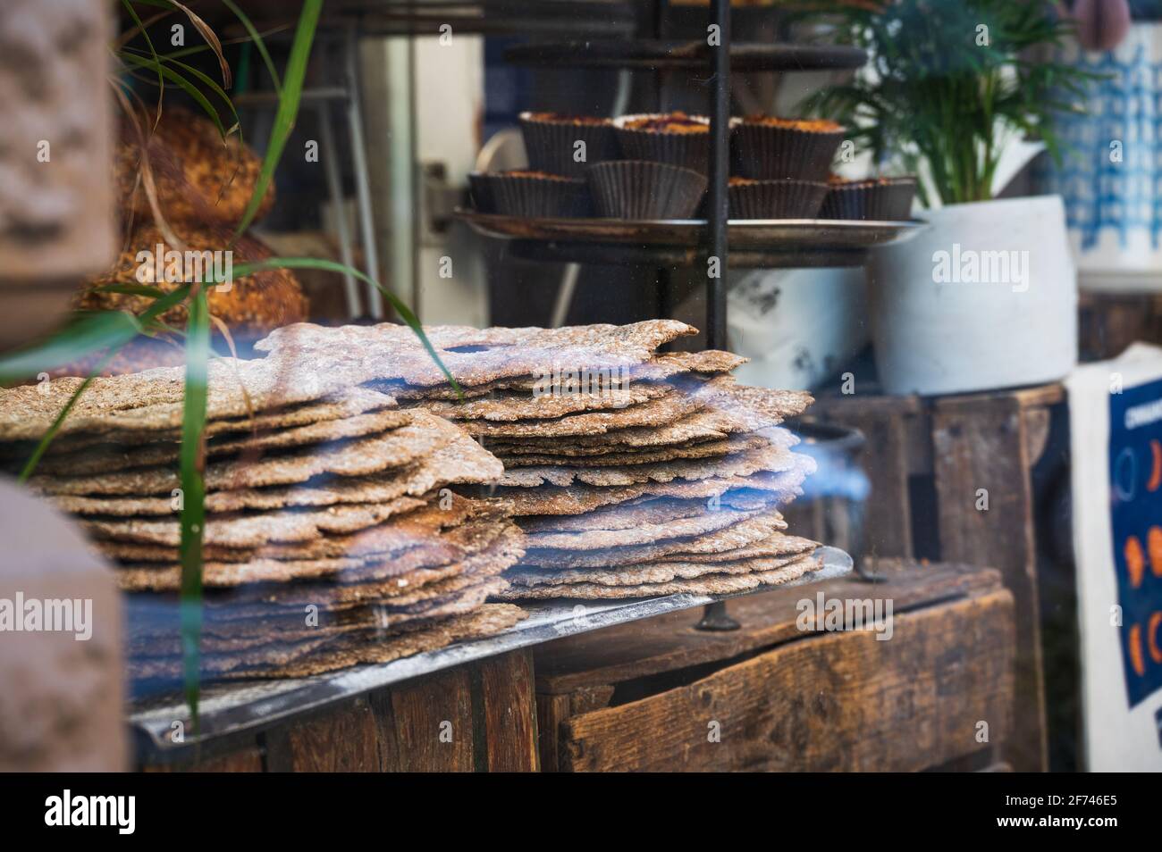 Flatbread and pastries in rustic display Stock Photo - Alamy