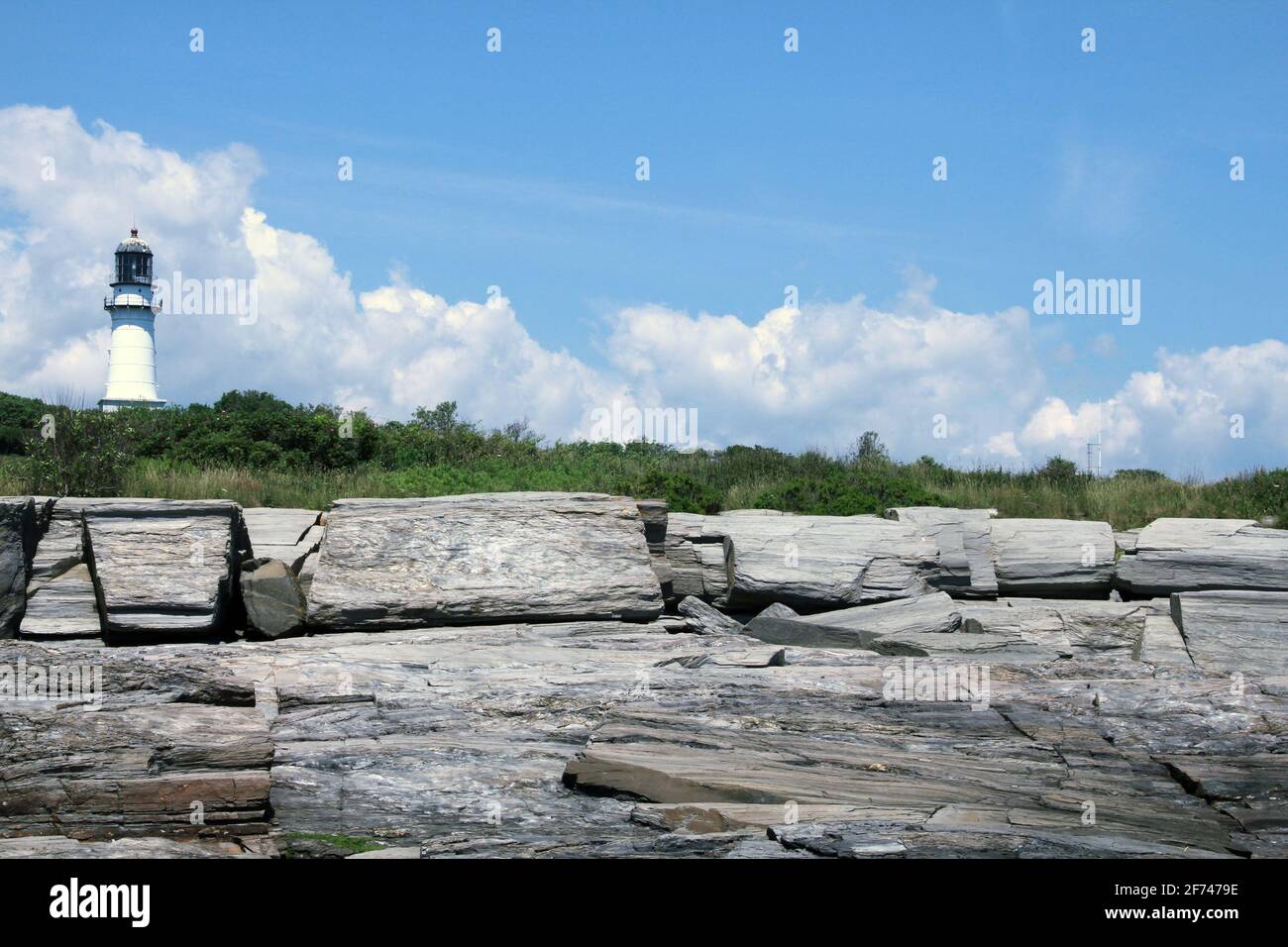 Coastline landscape view from sea water edge toward shore of a ...