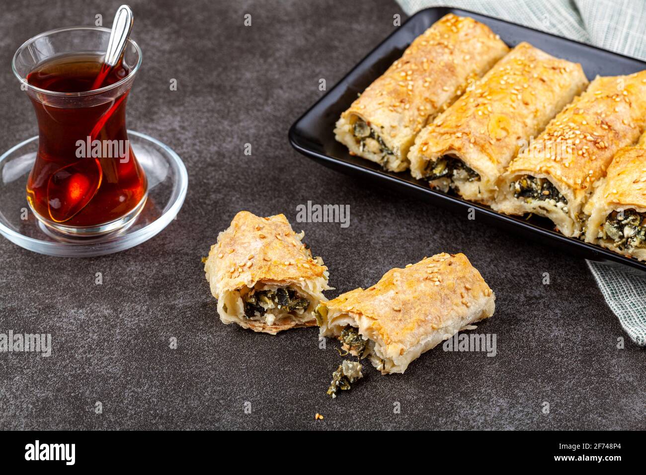 Traditional Turkish spinach pastry rolls ( Ispanakli borek ) served on ...