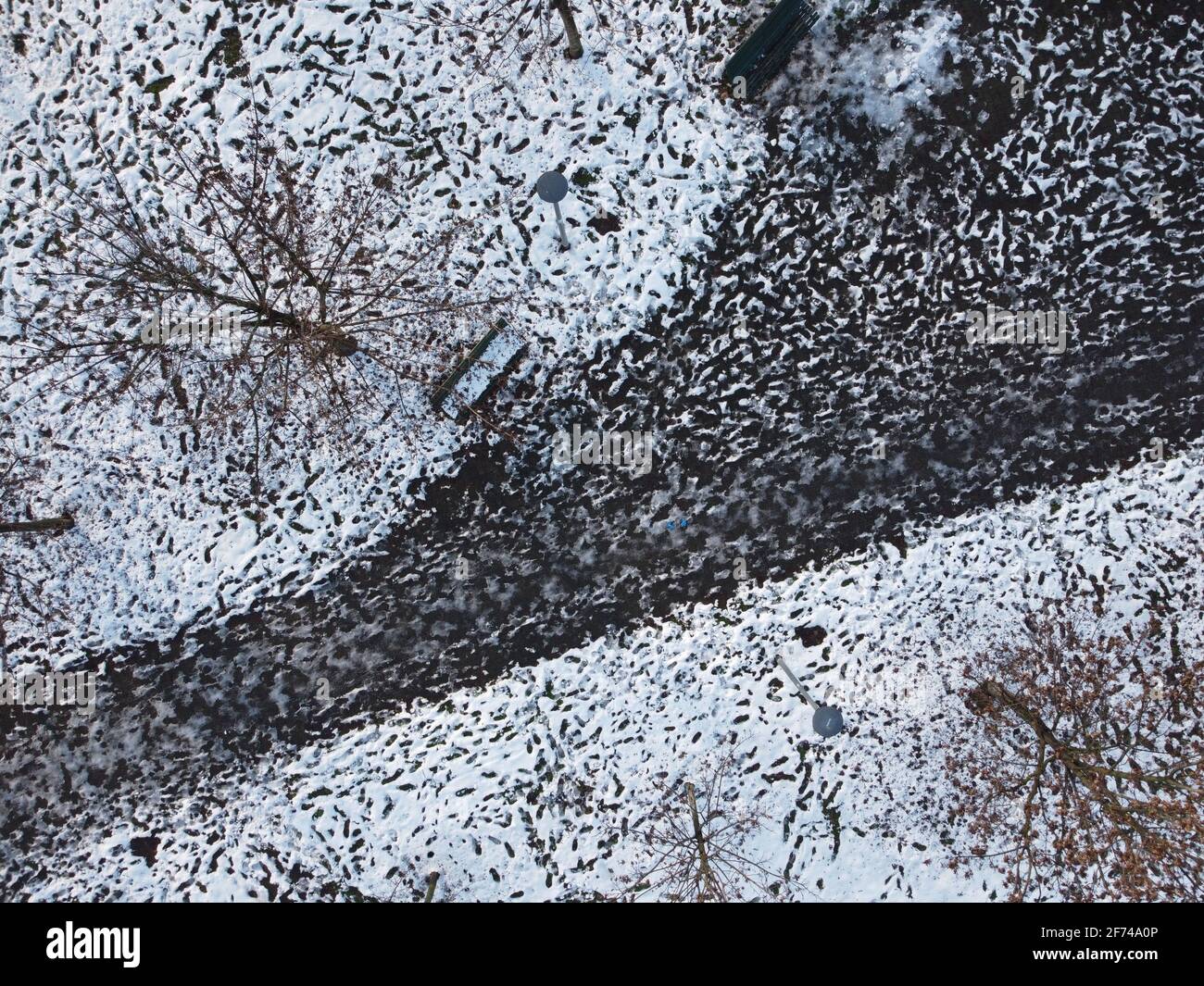 Aerial view of footsteps in the snow Stock Photo - Alamy