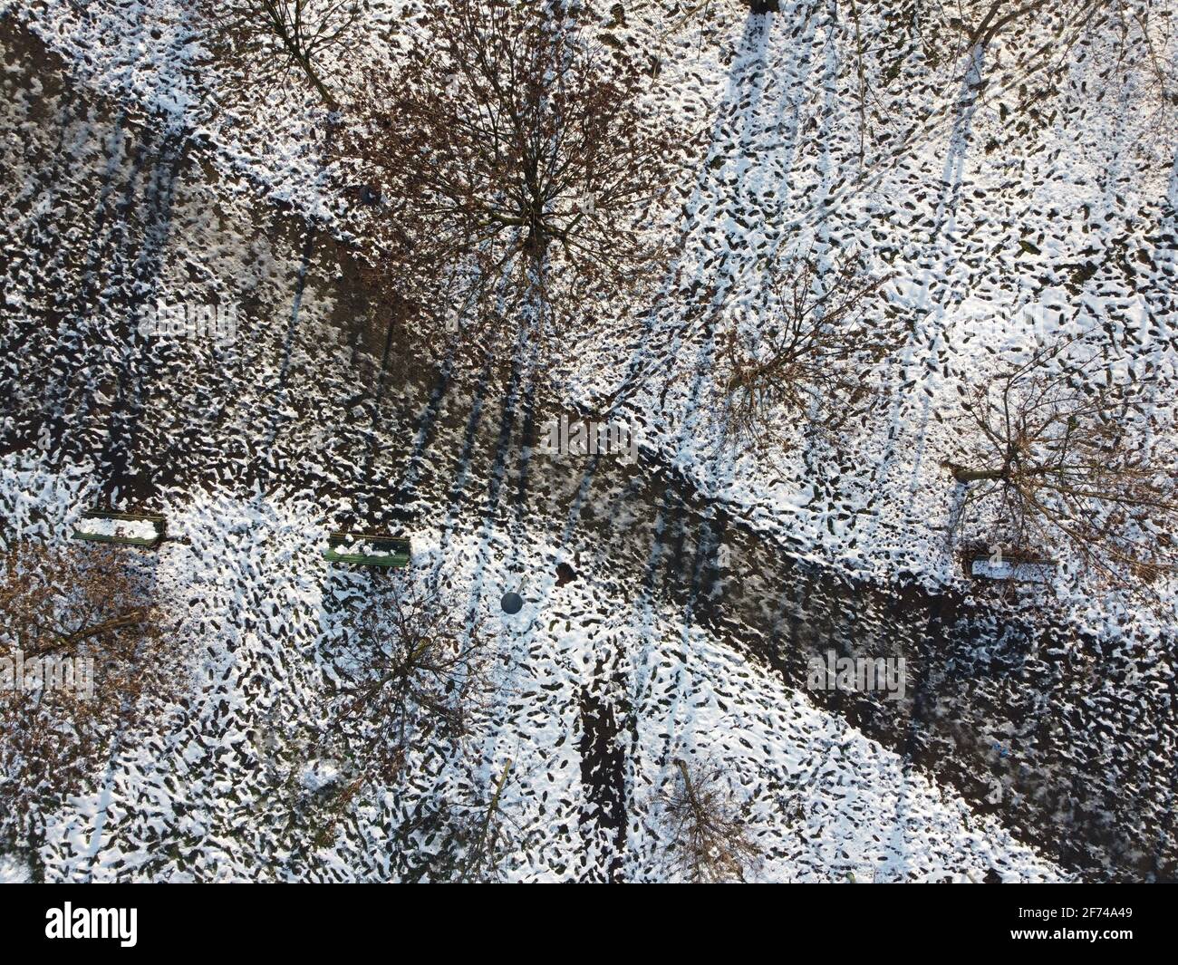 Aerial view of footsteps in the snow Stock Photo - Alamy